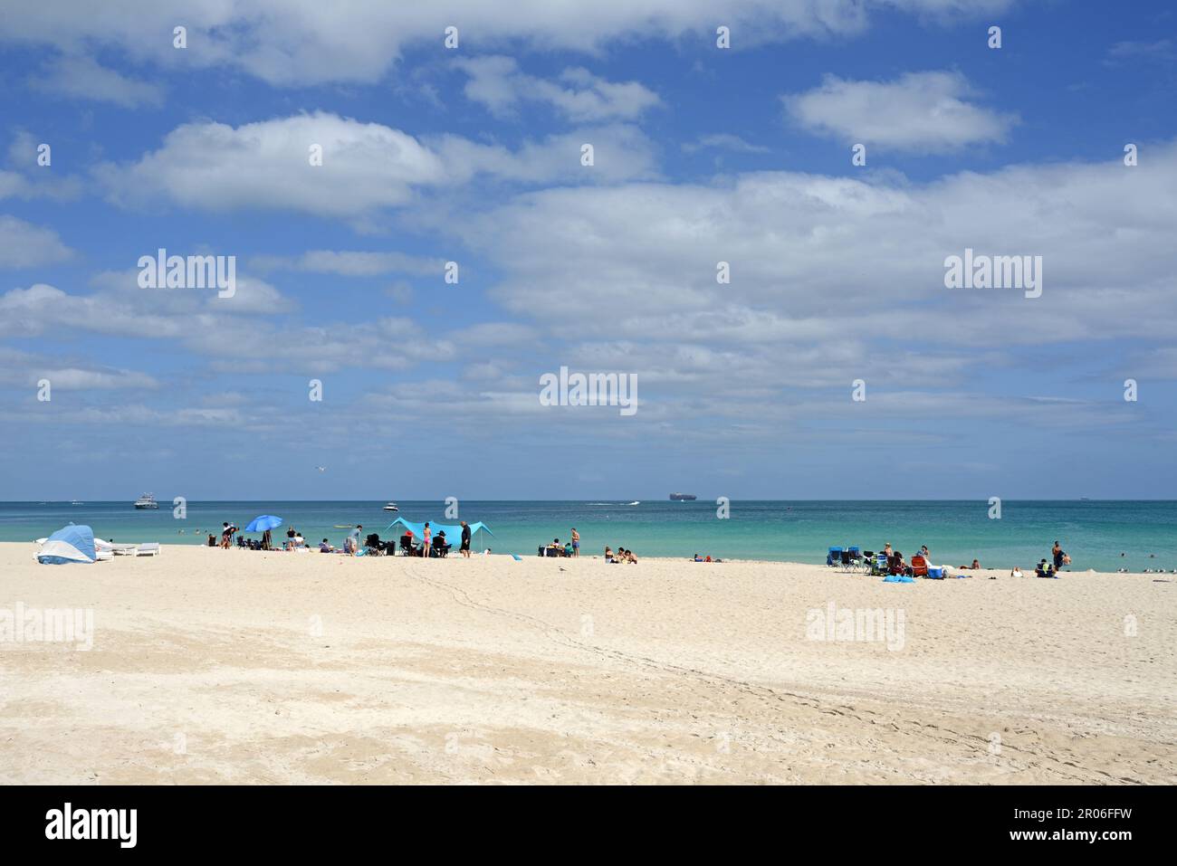 Paradise. Sunny sandy beach with sun loungers and umbrellas at South ...