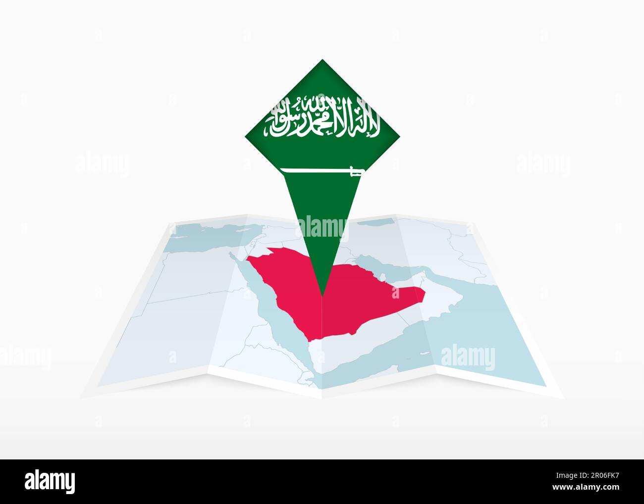 Saudi Arabia is depicted on a folded paper map and pinned location ...