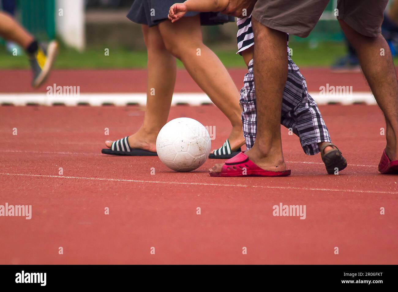 Men's Legs with White Soccer Ball Stock Photo - Alamy
