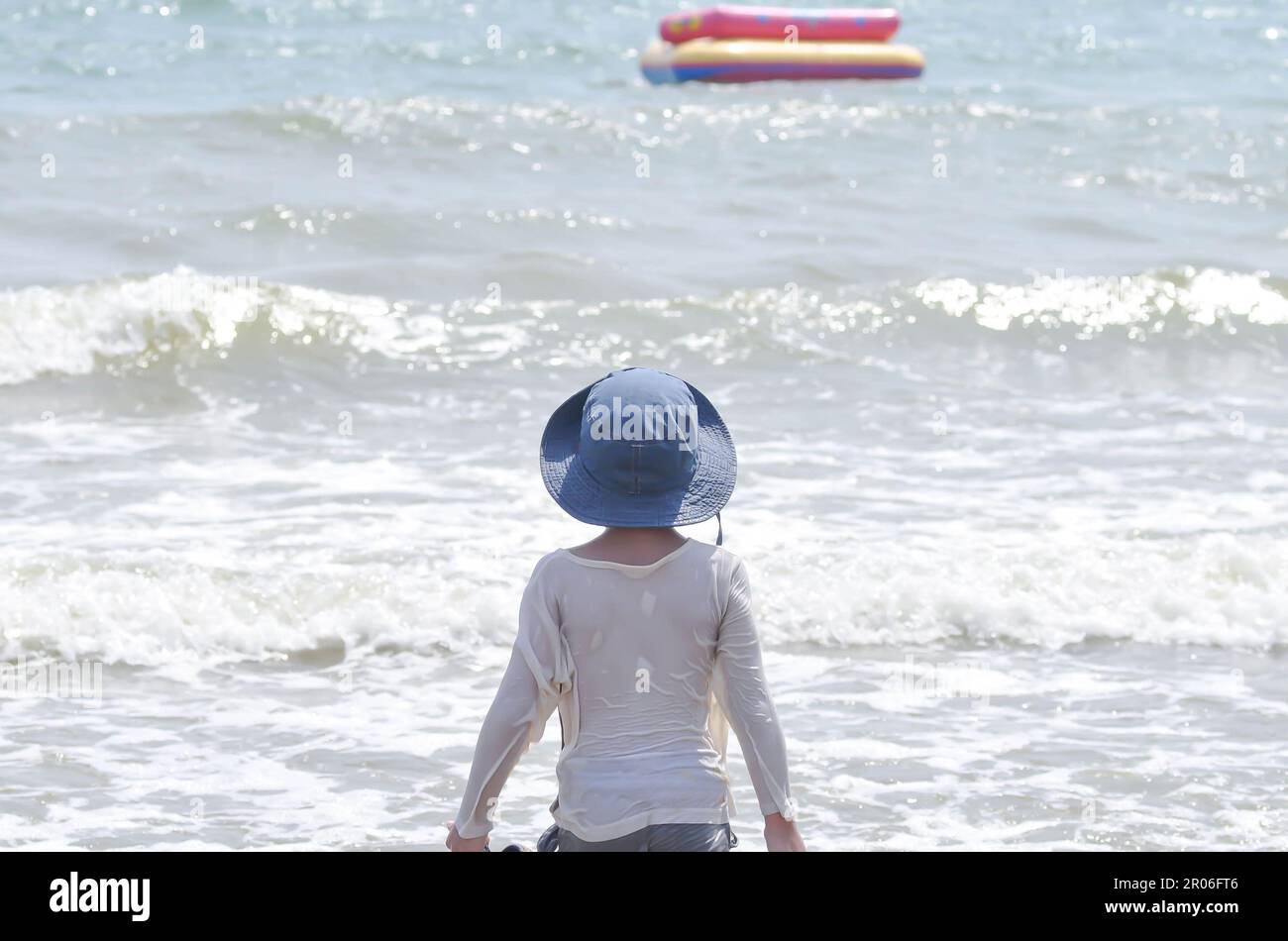 boy, sea and sun or sea background or a boy on the beach background ...