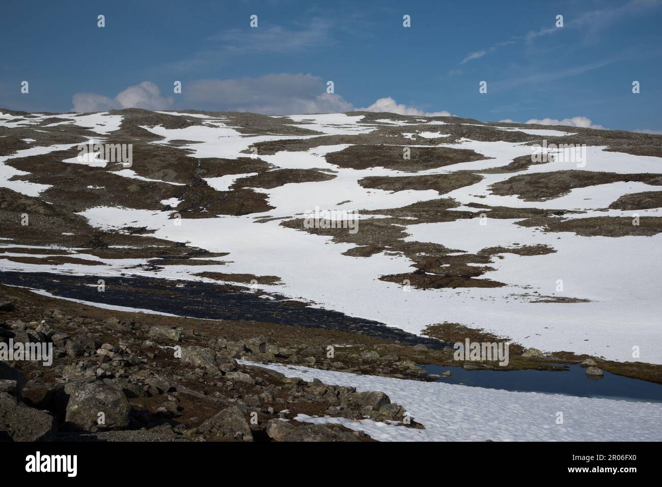 Aurlandsfjellet is crossed by a mountain road in 1306 meter above sea ...
