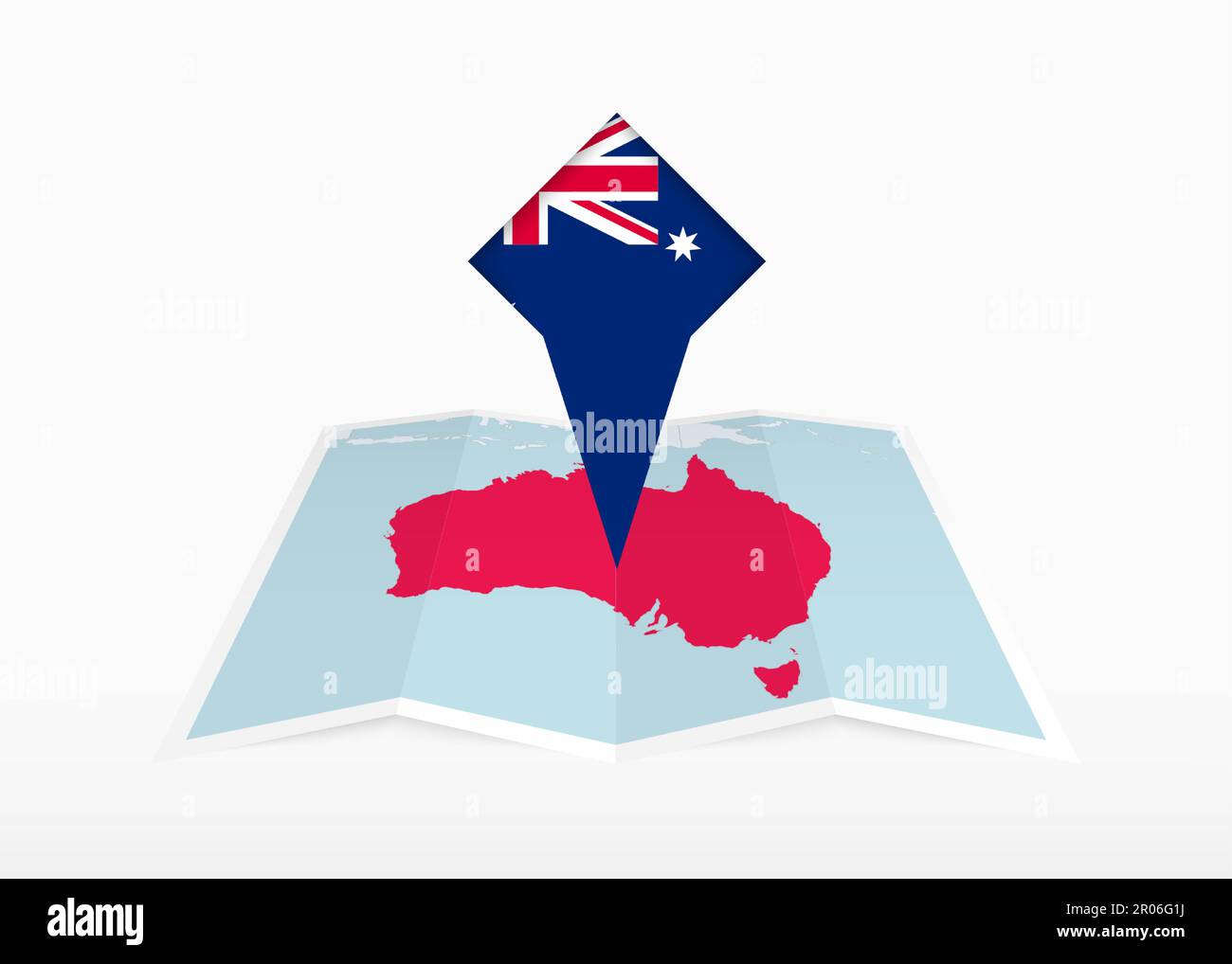 Australia is depicted on a folded paper map and pinned location marker ...