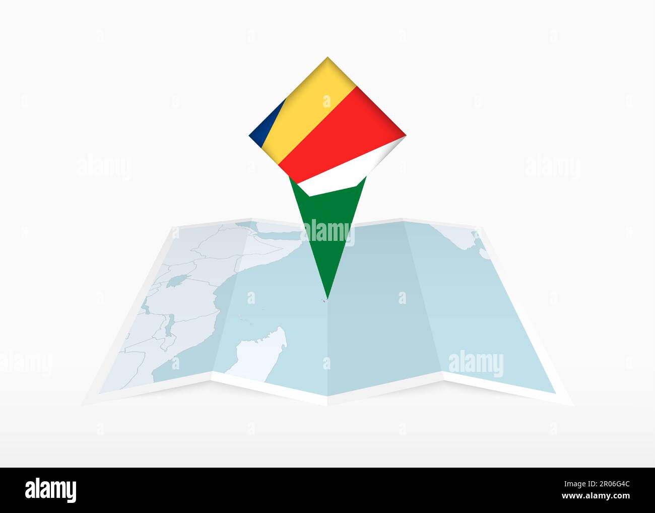 Seychelles is depicted on a folded paper map and pinned location marker with flag of Seychelles ...