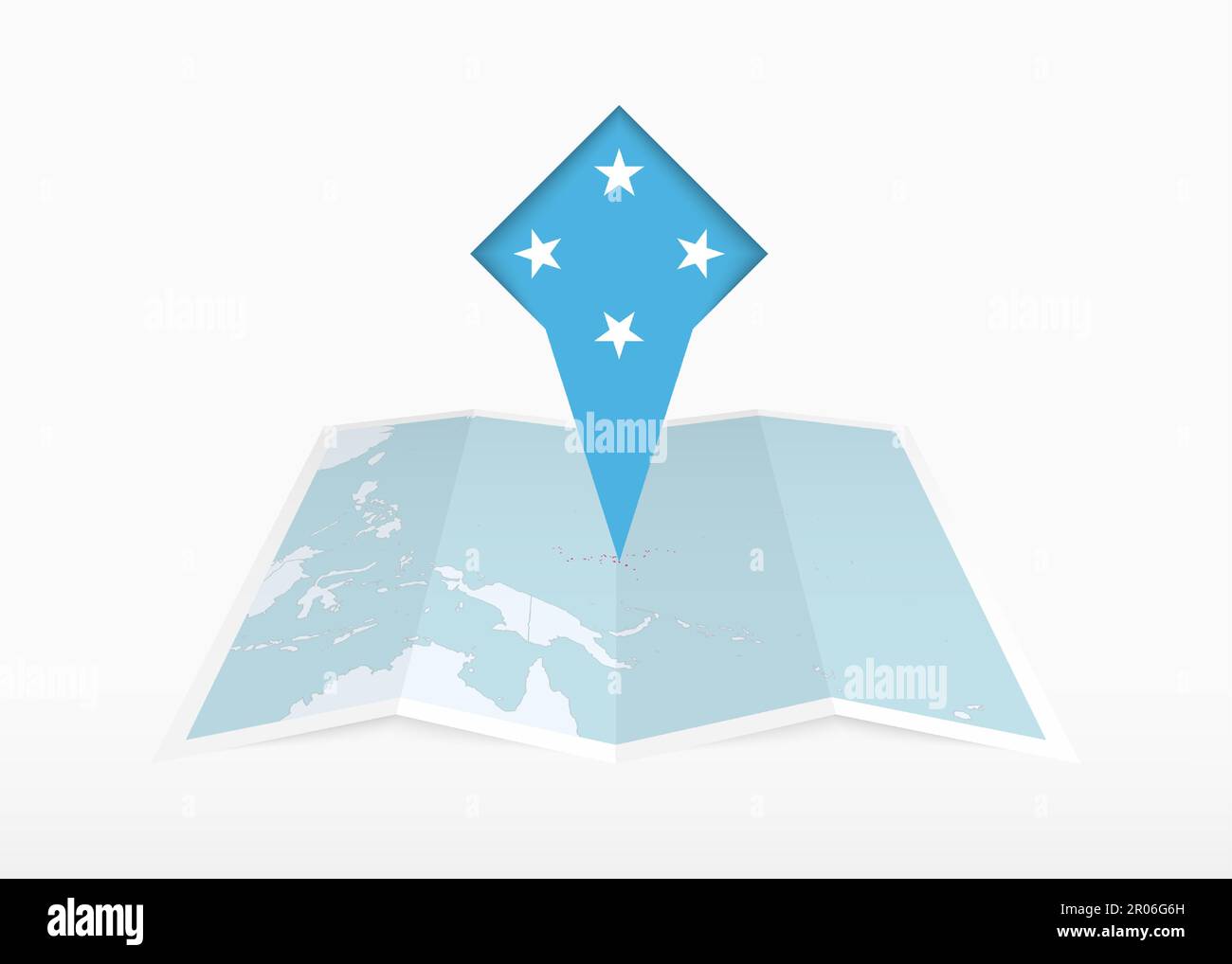 Micronesia is depicted on a folded paper map and pinned location marker ...
