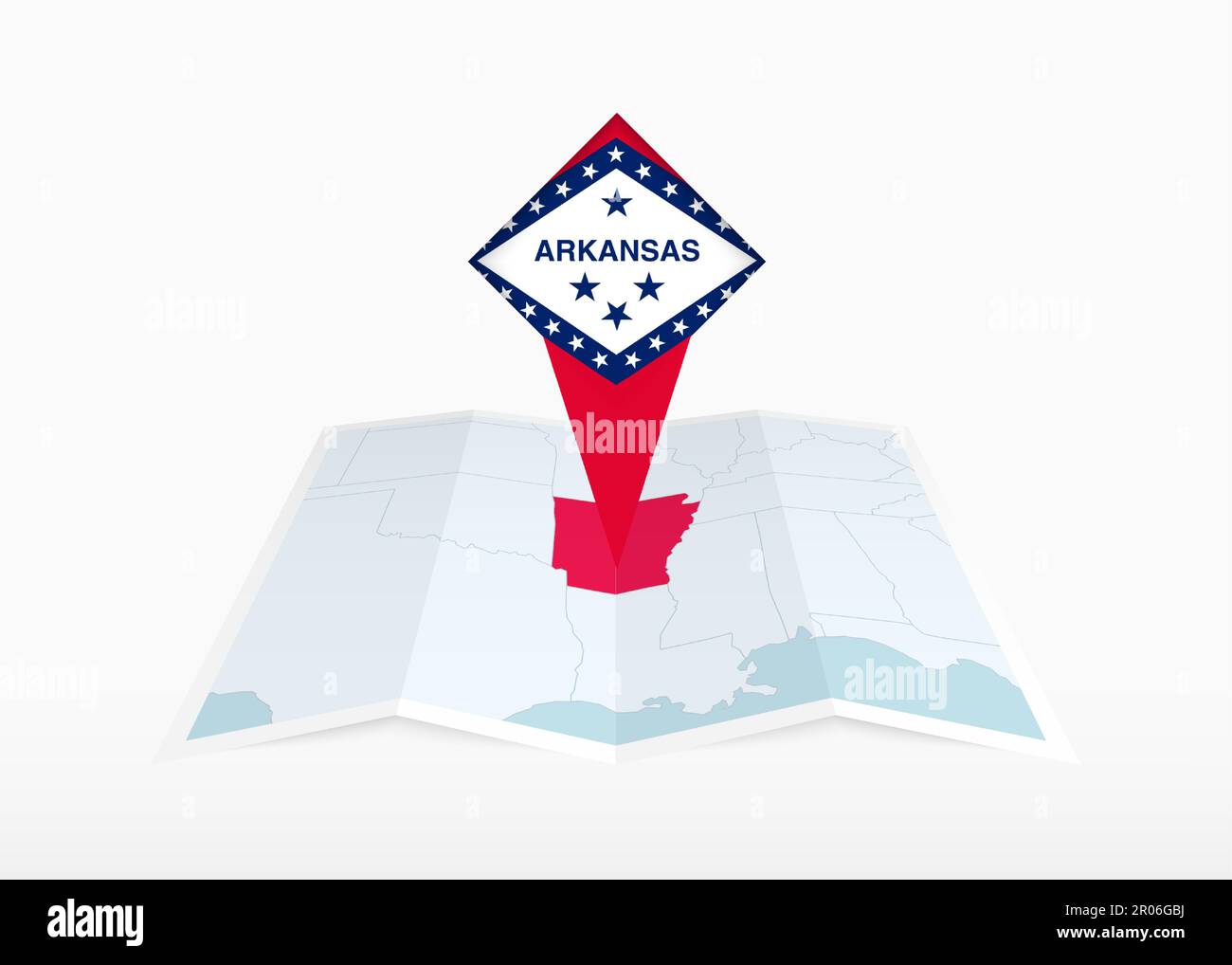 Arkansas is depicted on a folded paper map and pinned location marker ...