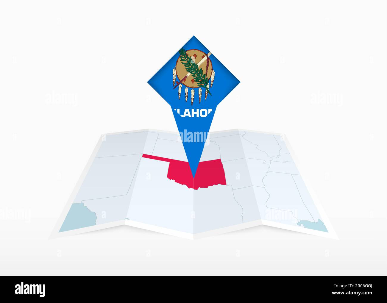 Oklahoma is depicted on a folded paper map and pinned location marker ...