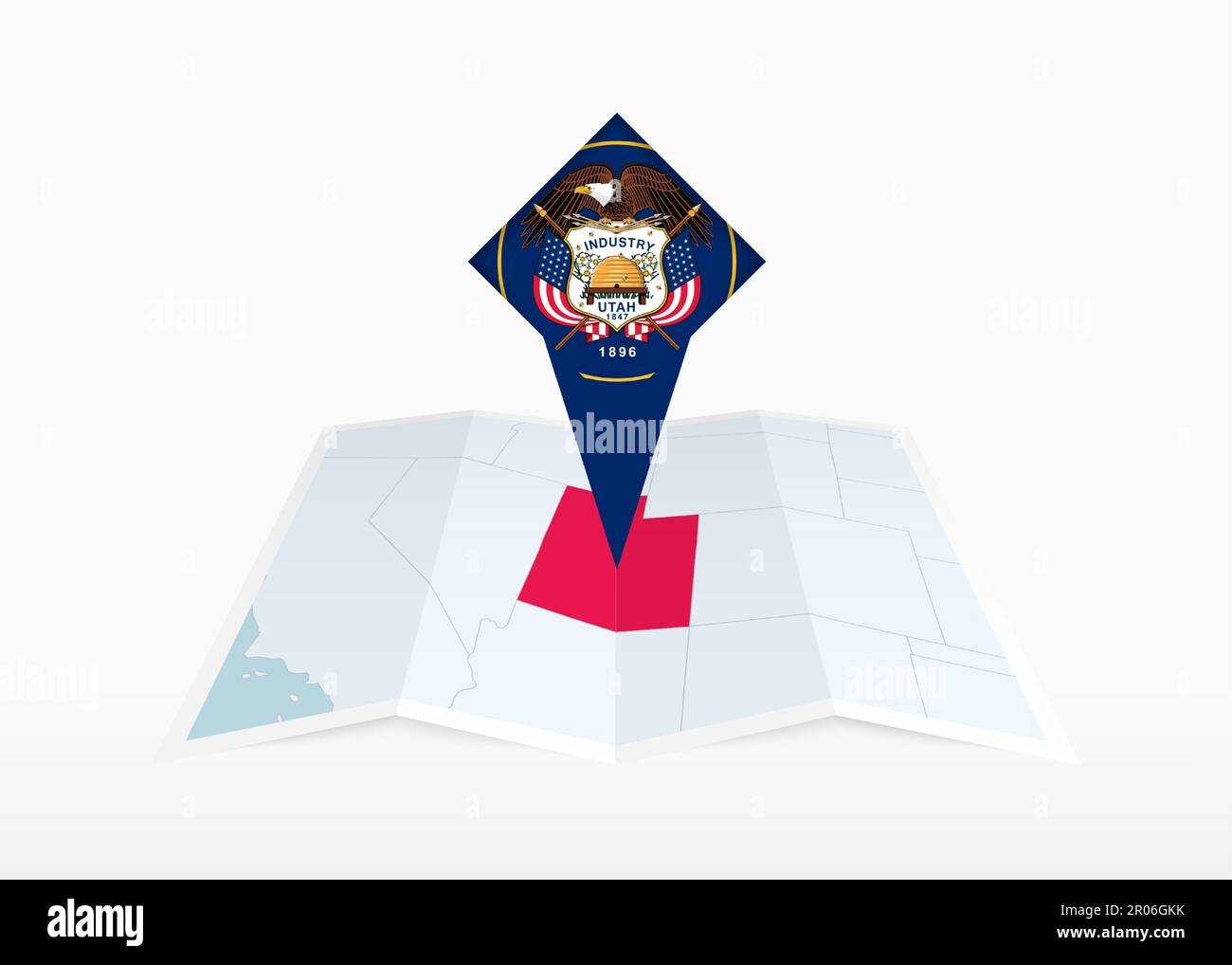 Utah is depicted on a folded paper map and pinned location marker with ...