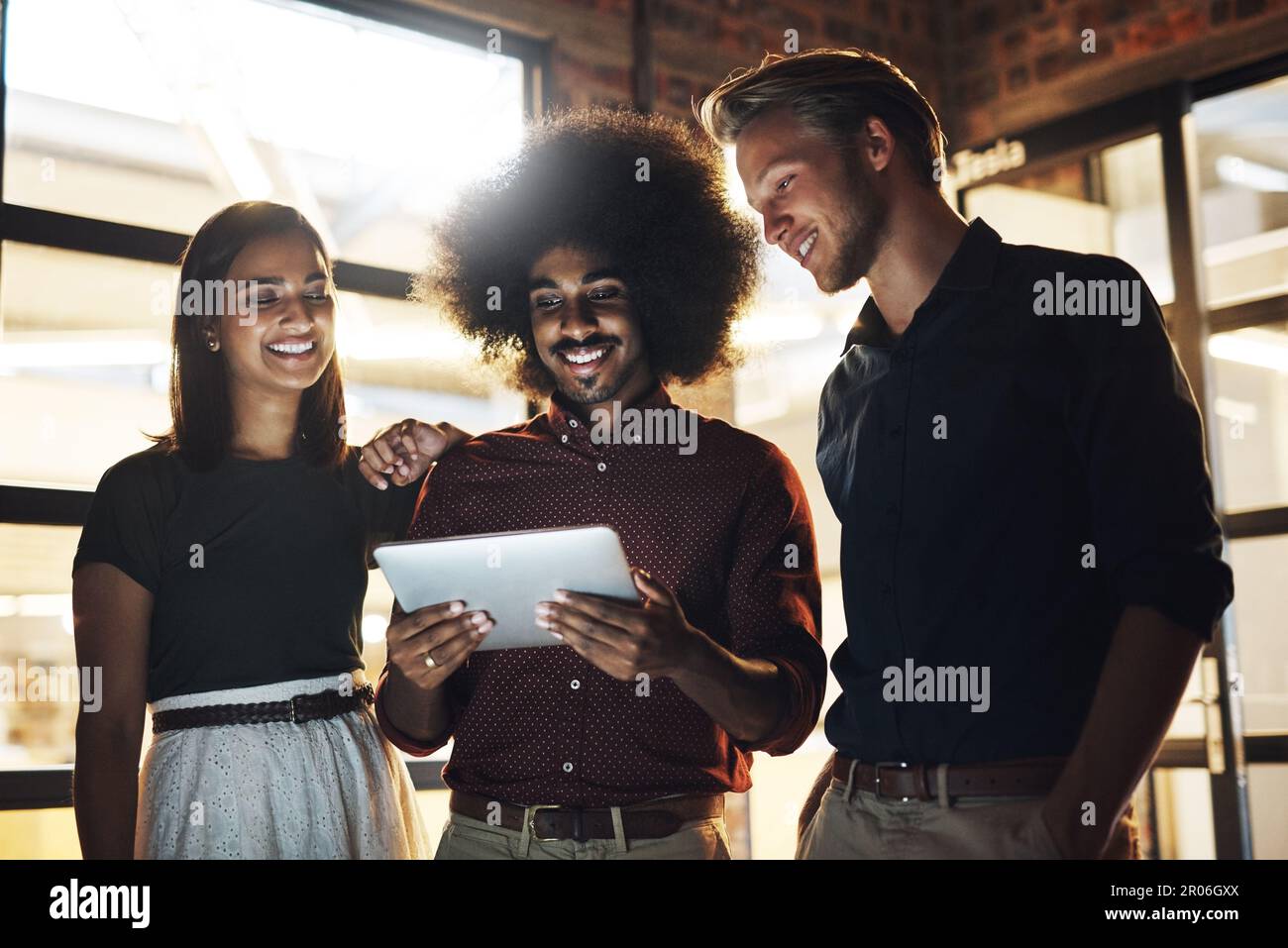 Three heads are better than one. a group of young designers having a ...