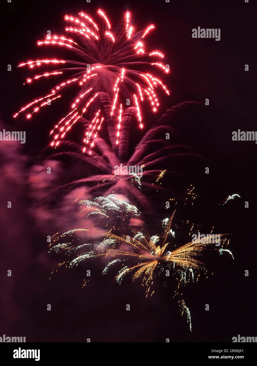 Firework amusement entertainment, fun at night Stock Photo - Alamy