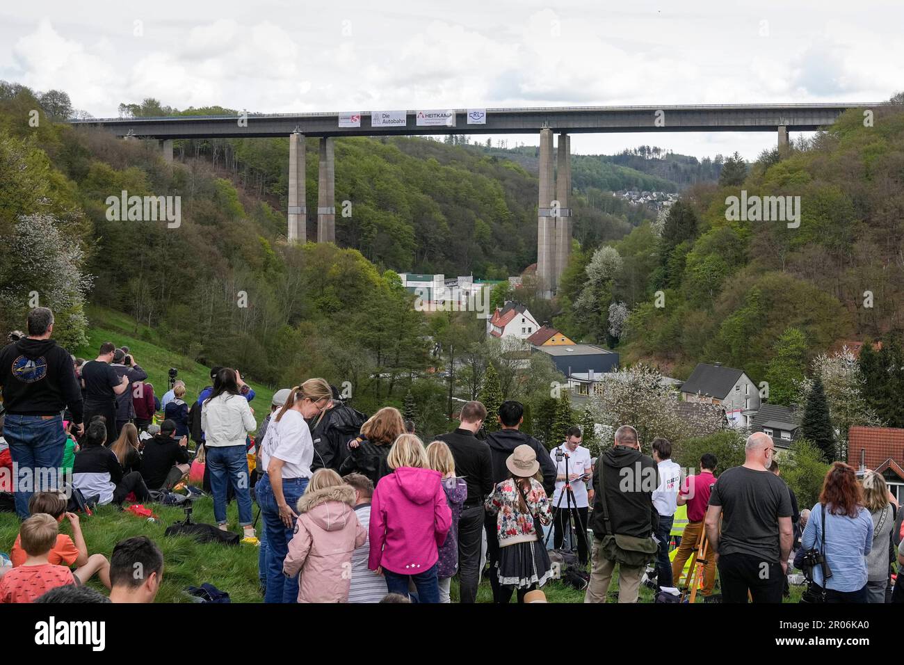 People wait for the detonation of the 450 meter long and 70 meter high ...