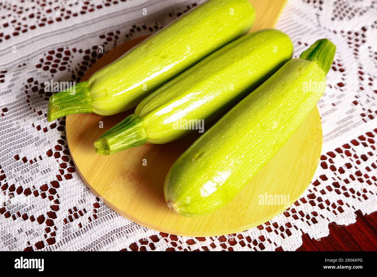 Fresh green courgettes in the kitchen, in natural light Stock Photo - Alamy