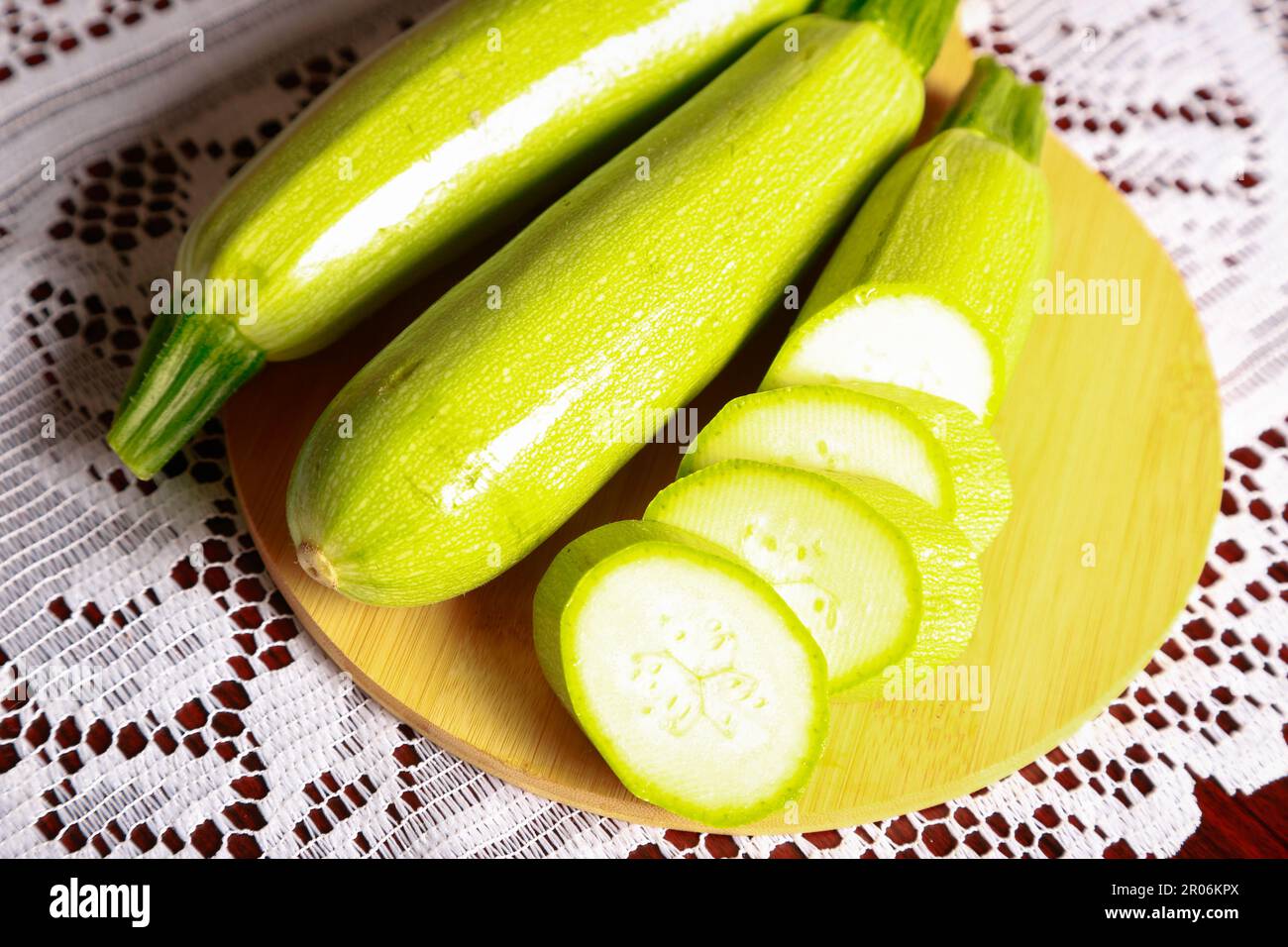 Fresh green courgettes in the kitchen, in natural light Stock Photo - Alamy