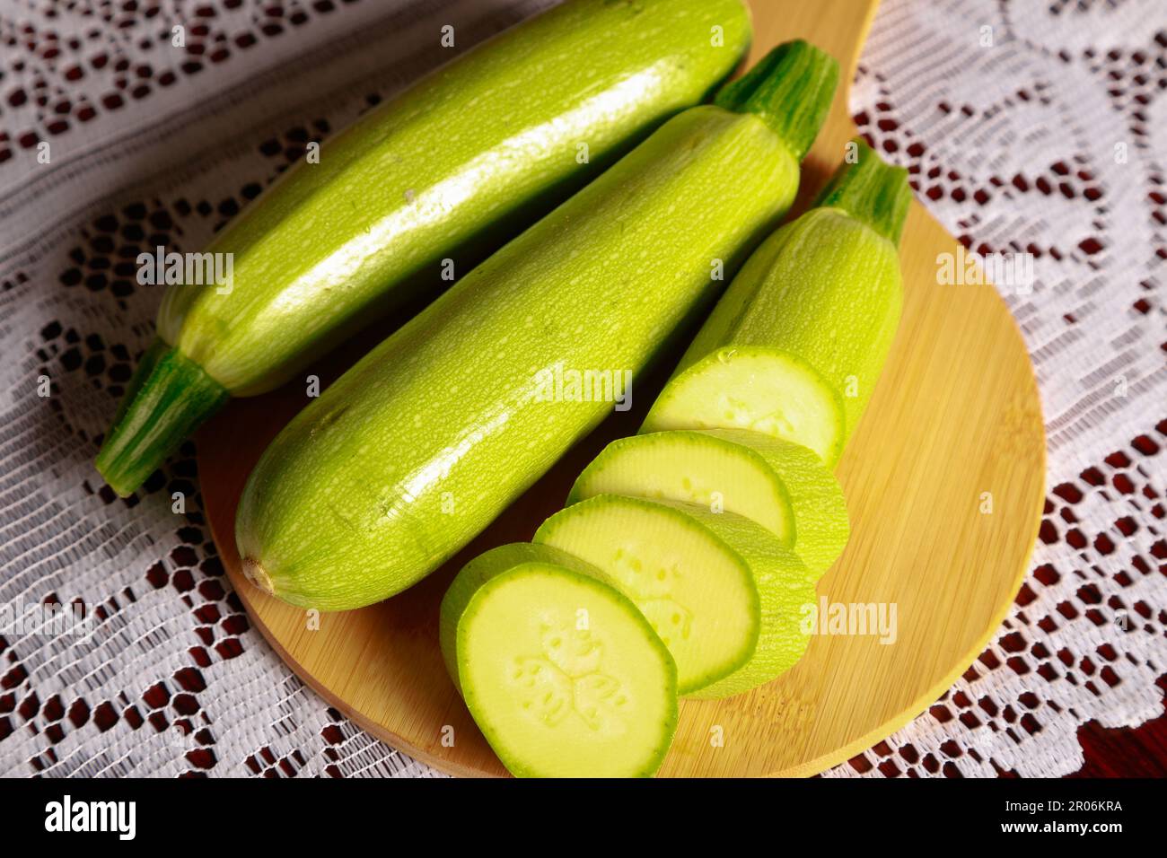 Fresh green courgettes in the kitchen, in natural light Stock Photo - Alamy