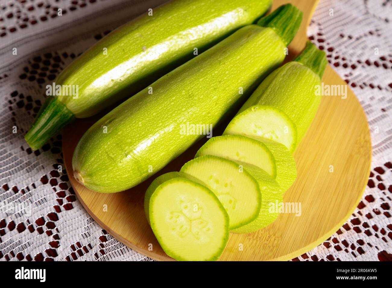 Fresh green courgettes in the kitchen, in natural light Stock Photo - Alamy