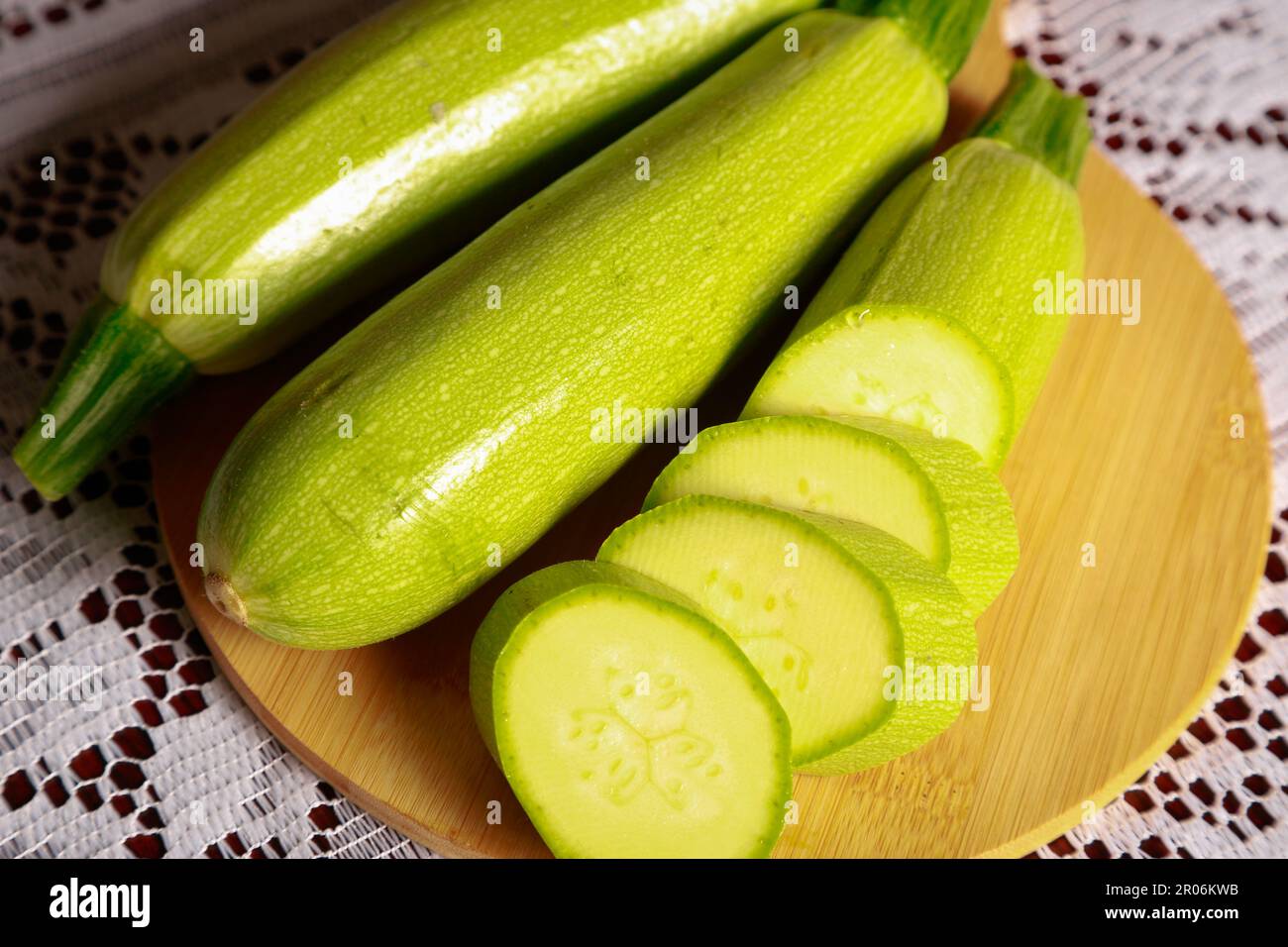 Fresh green courgettes in the kitchen, in natural light Stock Photo - Alamy