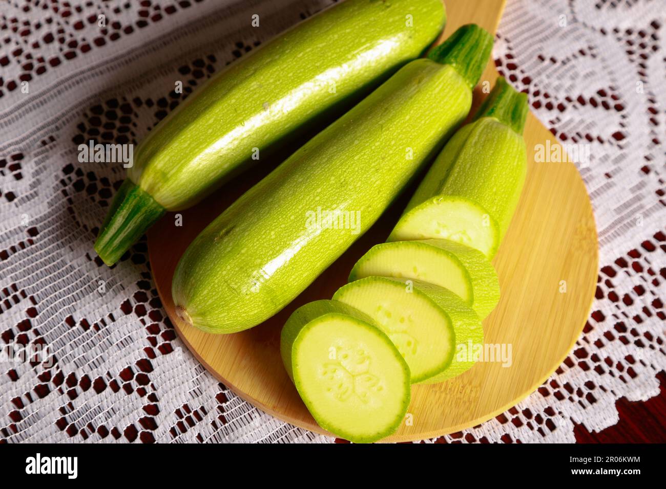 Fresh green courgettes in the kitchen, in natural light Stock Photo - Alamy
