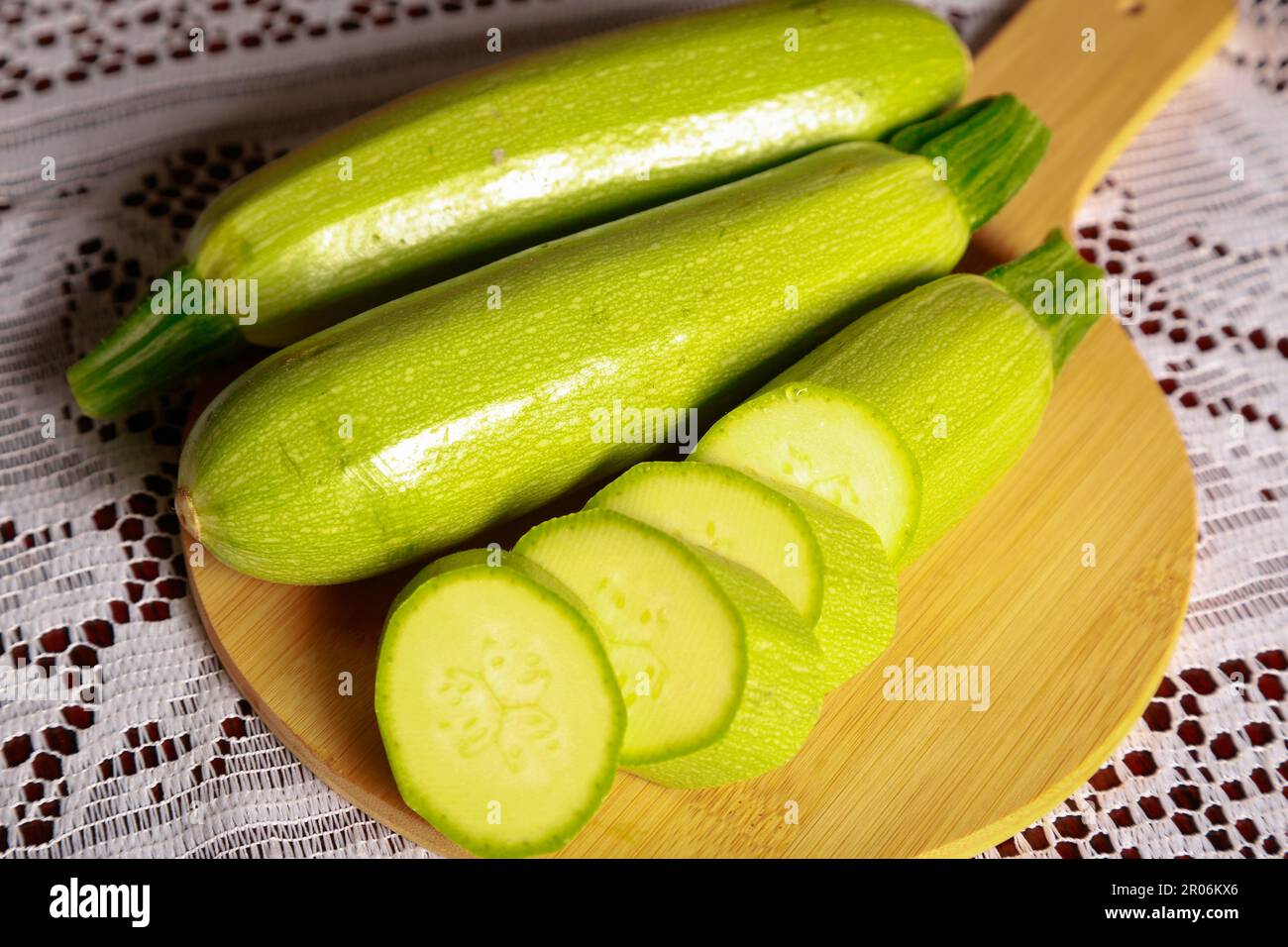 Fresh green courgettes in the kitchen, in natural light Stock Photo - Alamy