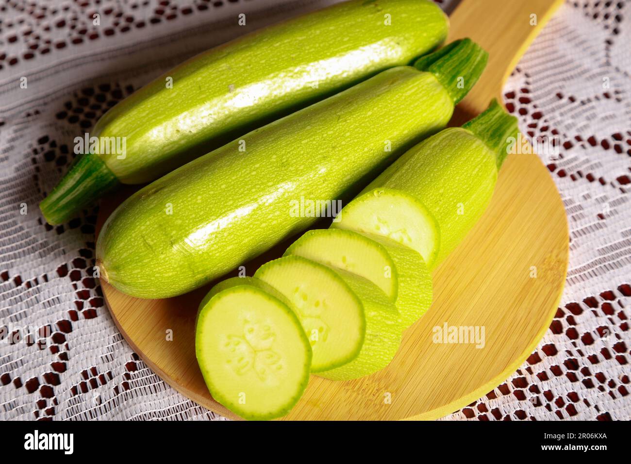 Fresh green courgettes in the kitchen, in natural light Stock Photo - Alamy