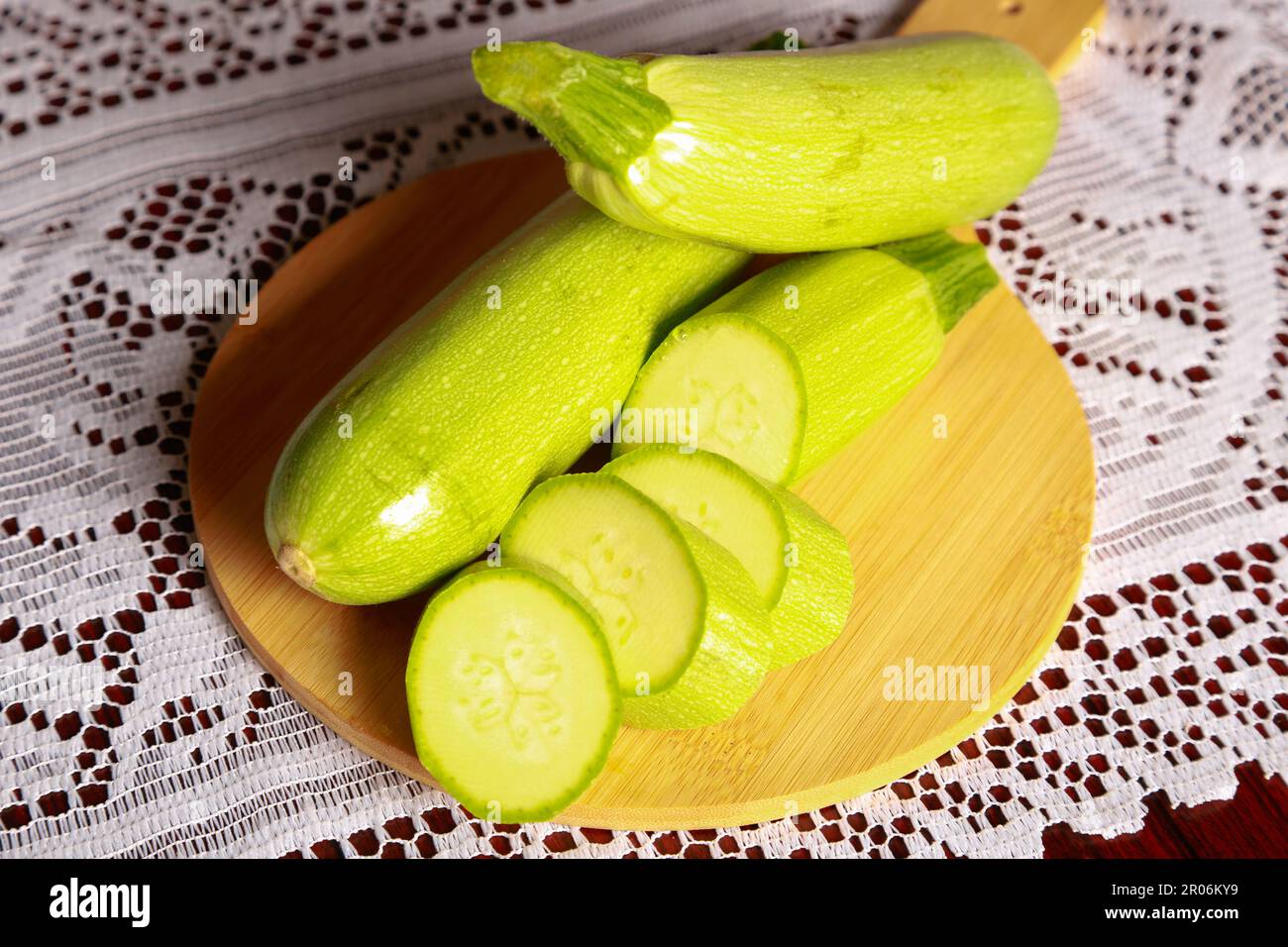 Fresh green courgettes in the kitchen, in natural light Stock Photo - Alamy