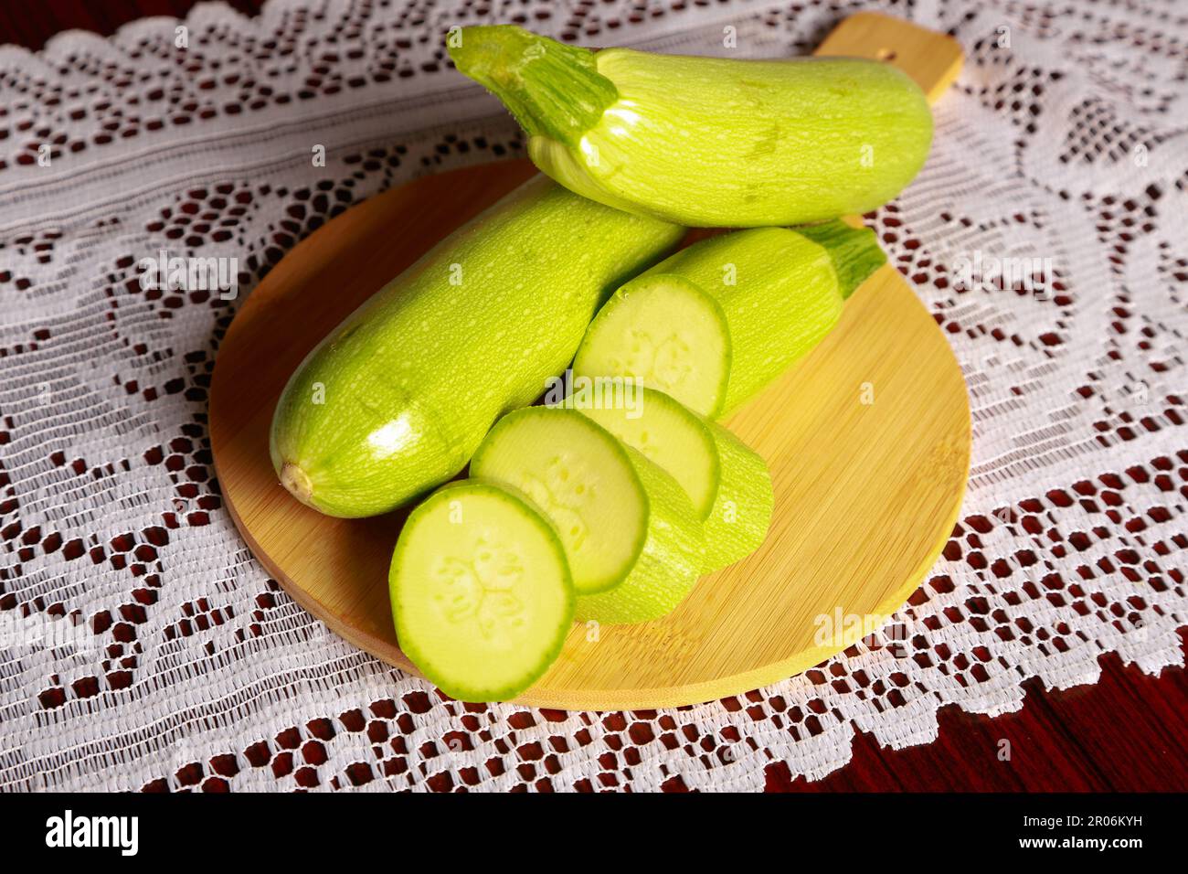 Fresh green courgettes in the kitchen, in natural light Stock Photo - Alamy