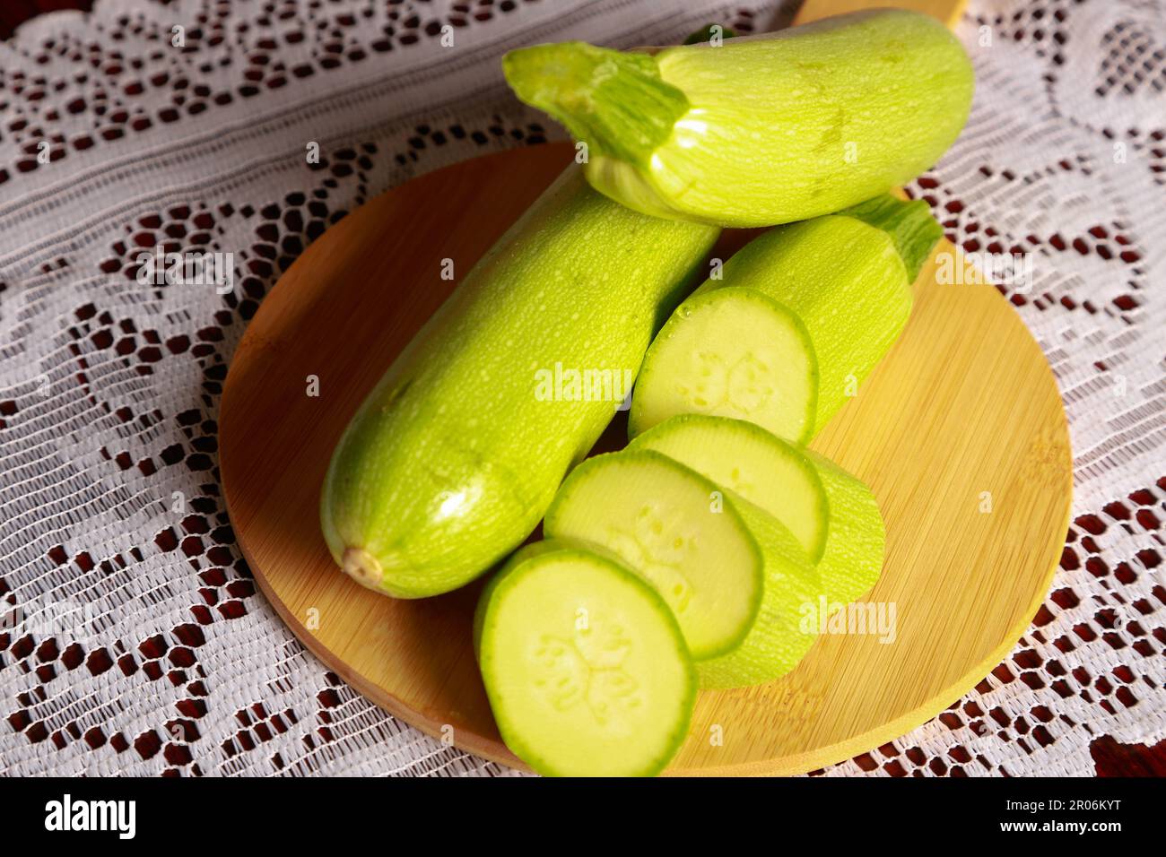 Fresh green courgettes in the kitchen, in natural light Stock Photo - Alamy