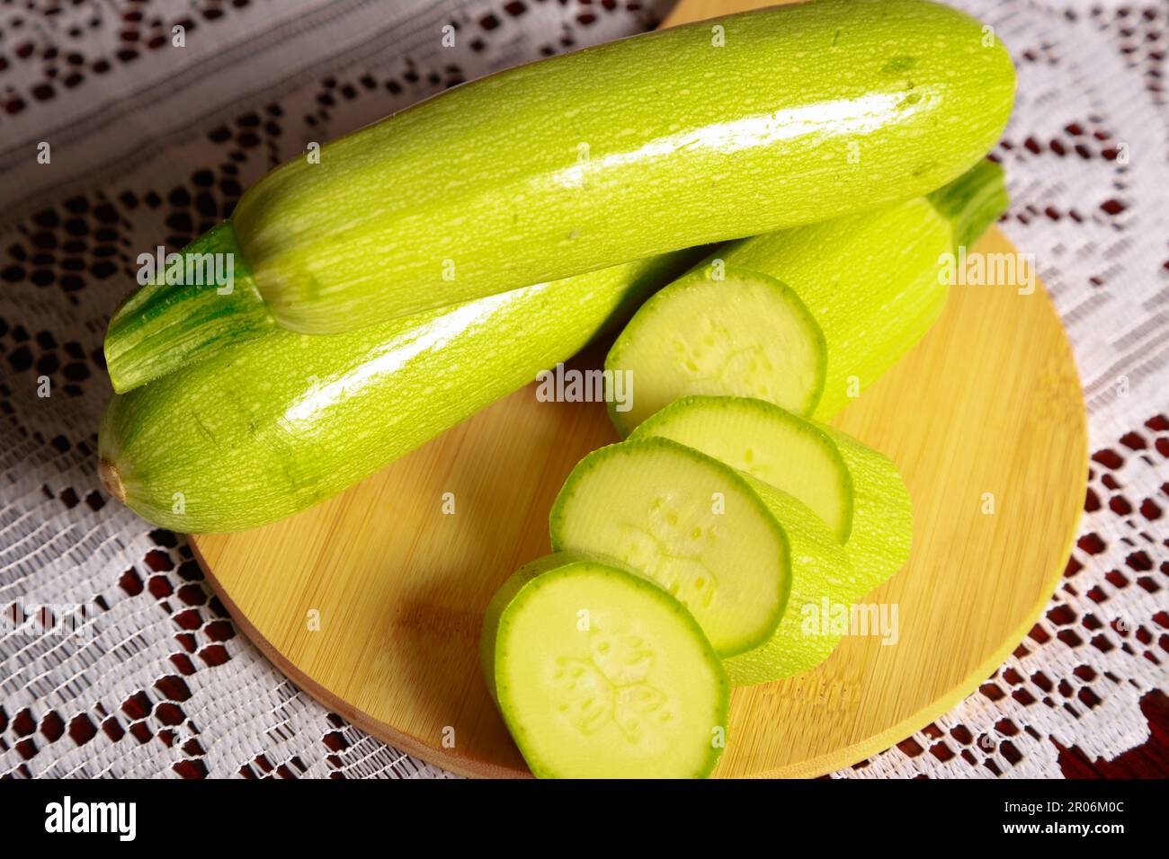 Fresh green courgettes in the kitchen, in natural light Stock Photo - Alamy