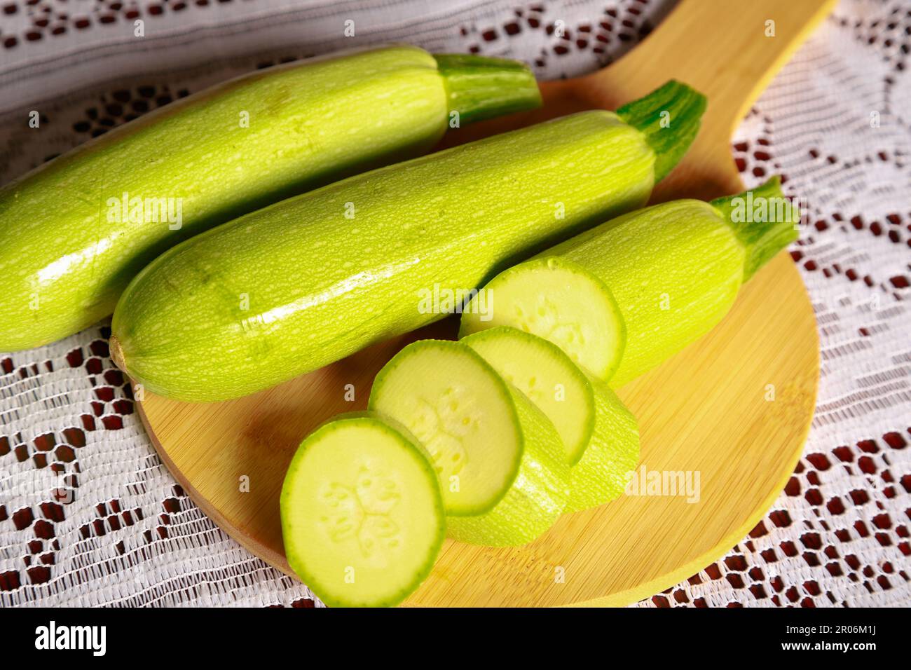 Fresh green courgettes in the kitchen, in natural light Stock Photo - Alamy