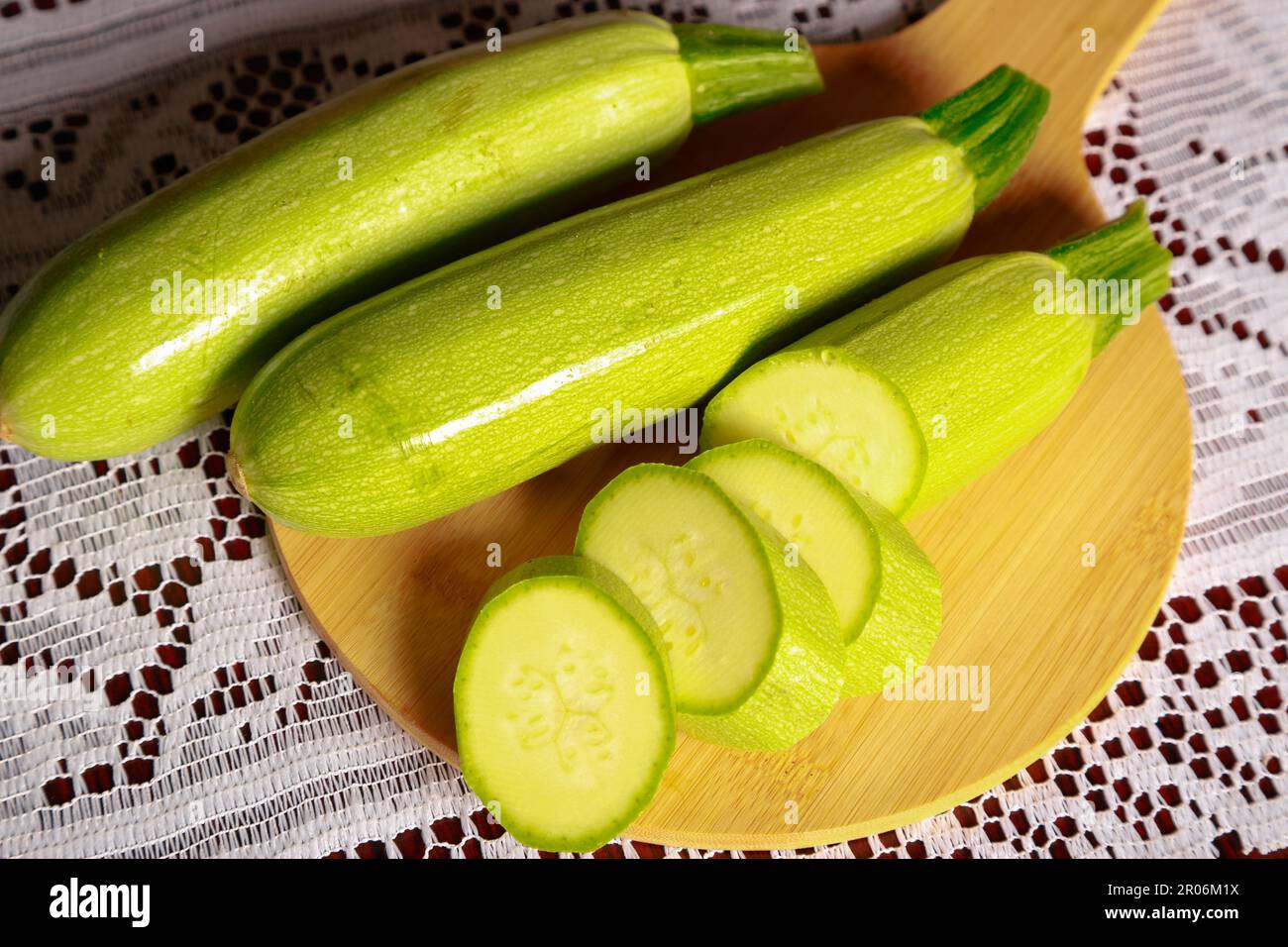Fresh green courgettes in the kitchen, in natural light Stock Photo - Alamy