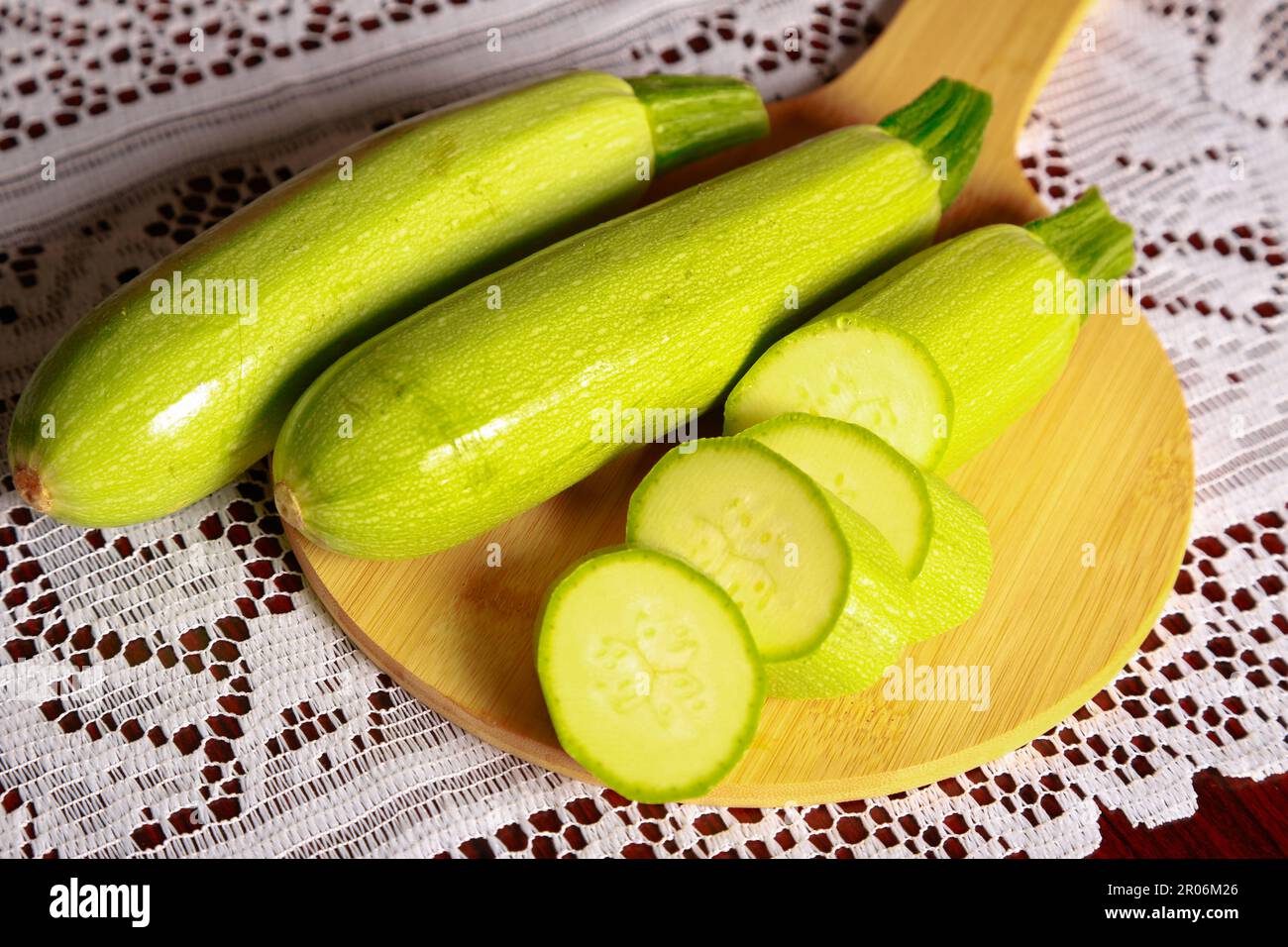 Fresh green courgettes in the kitchen, in natural light Stock Photo - Alamy