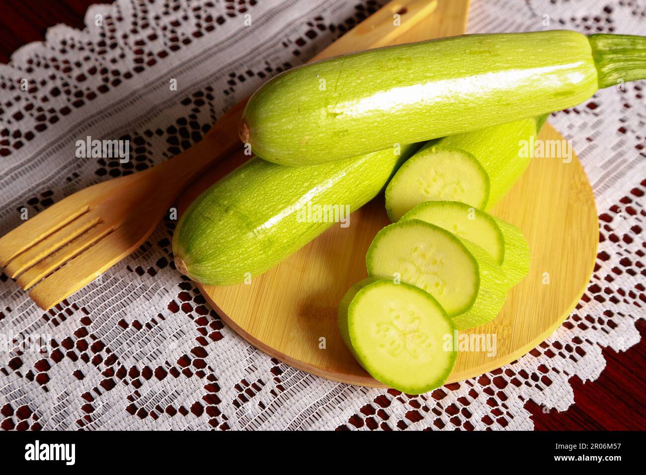Fresh green courgettes in the kitchen, in natural light Stock Photo - Alamy
