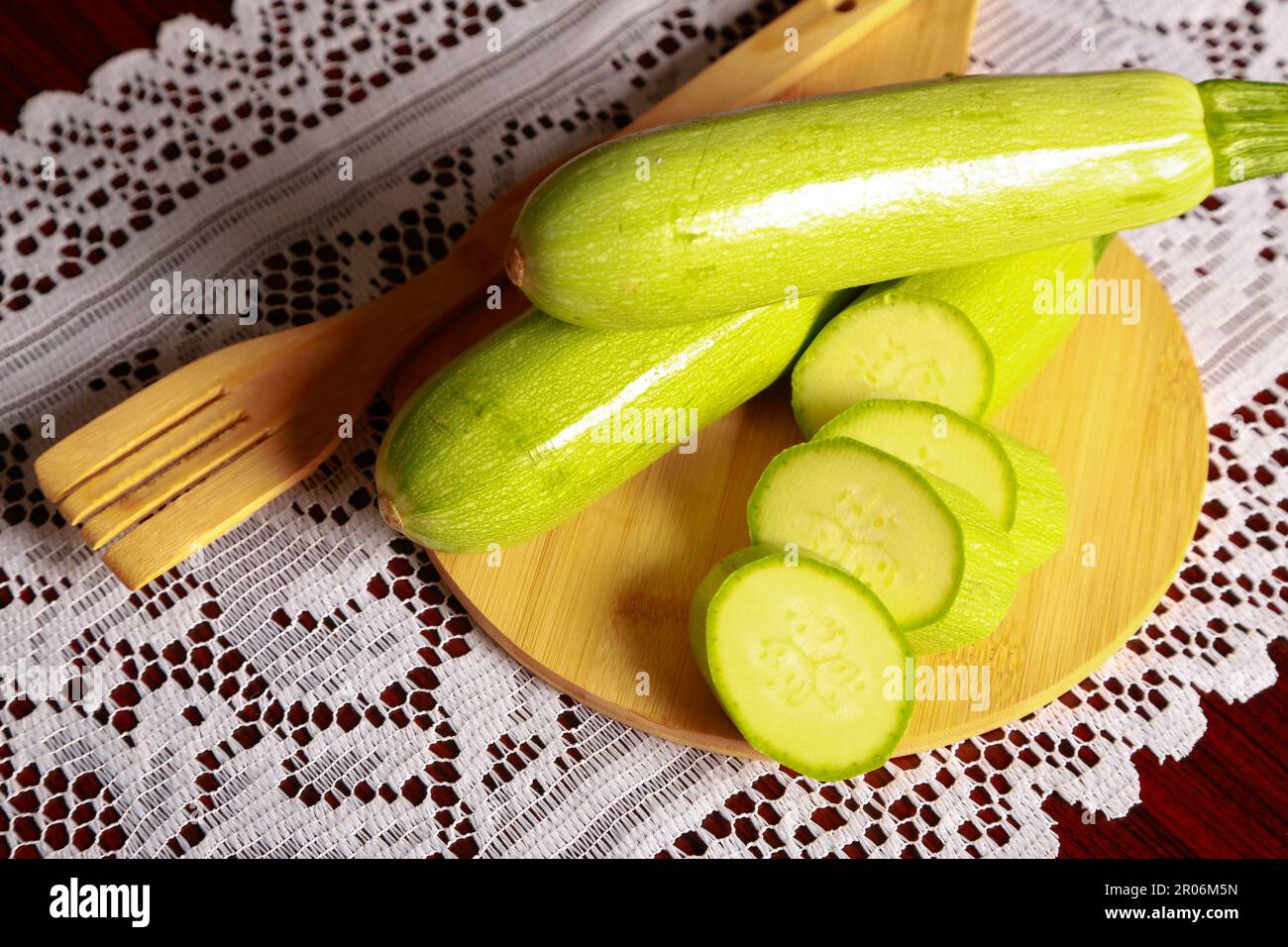 Fresh green courgettes in the kitchen, in natural light Stock Photo - Alamy