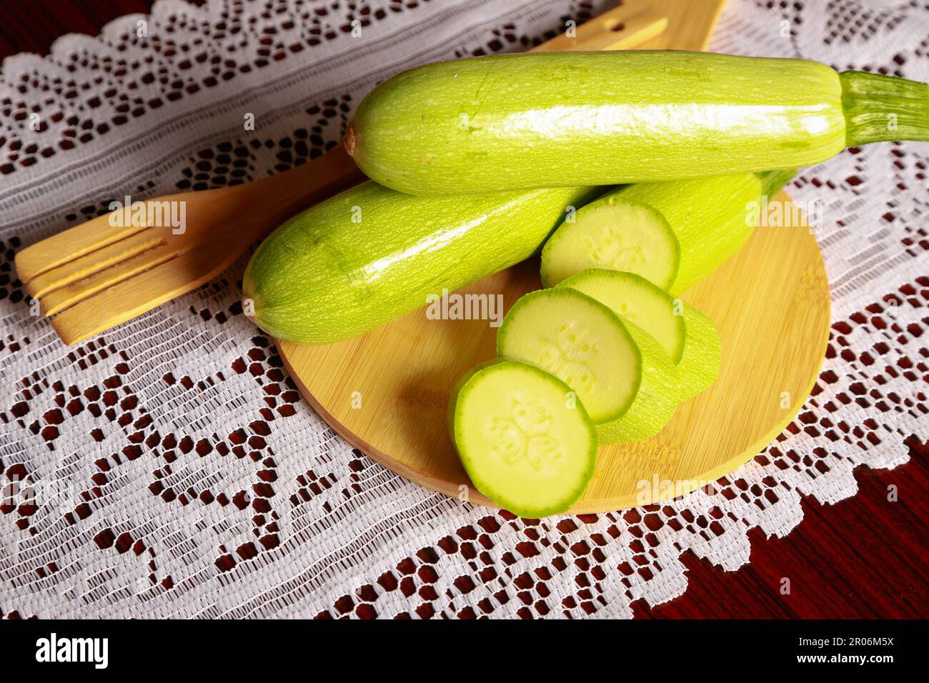 Fresh green courgettes in the kitchen, in natural light Stock Photo - Alamy