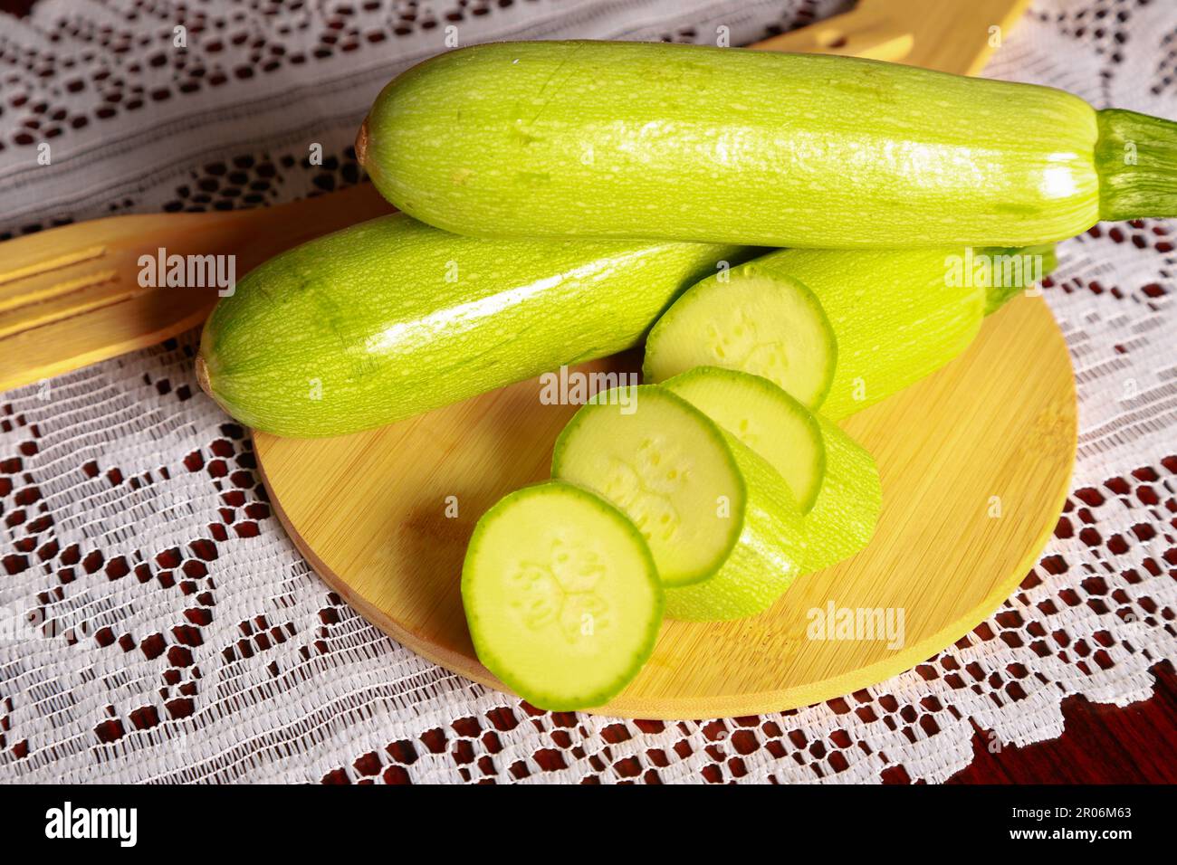 Fresh green courgettes in the kitchen, in natural light Stock Photo - Alamy