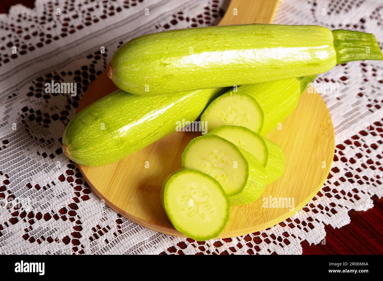 Fresh green courgettes in the kitchen, in natural light Stock Photo - Alamy