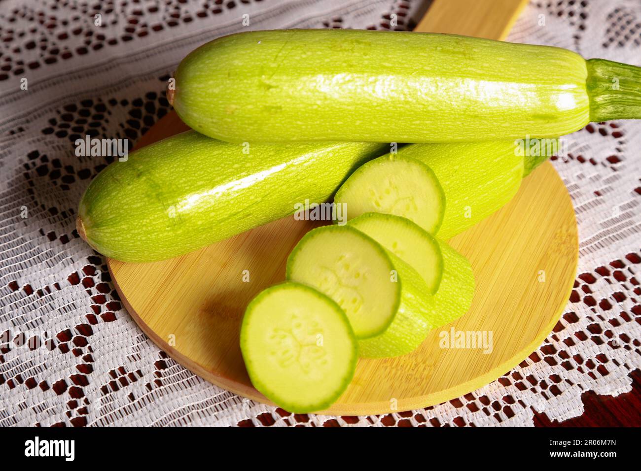 Fresh green courgettes in the kitchen, in natural light Stock Photo - Alamy