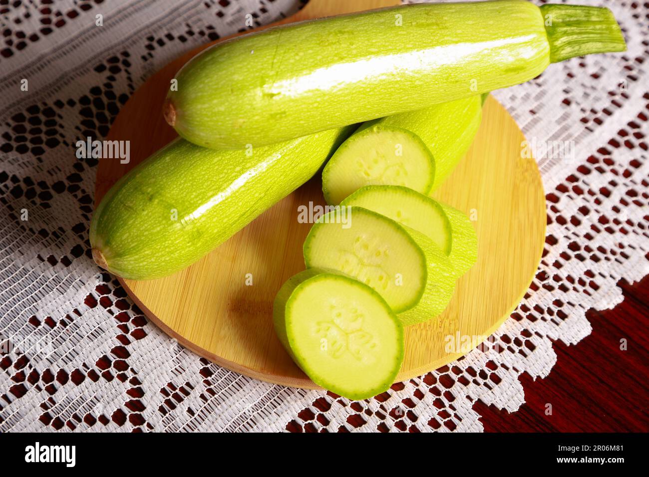 Fresh green courgettes in the kitchen, in natural light Stock Photo - Alamy