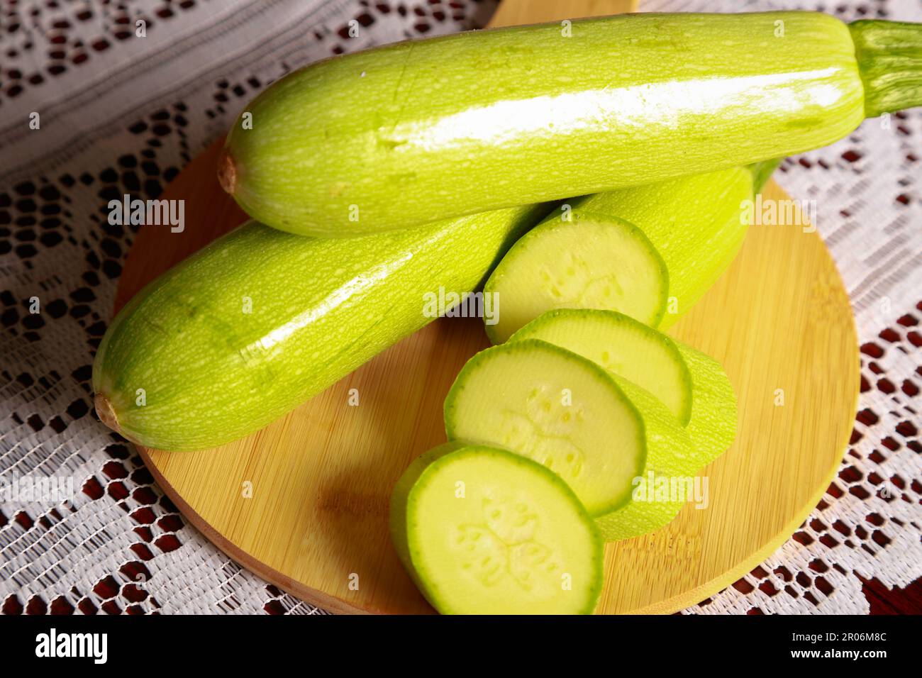 Fresh green courgettes in the kitchen, in natural light Stock Photo - Alamy
