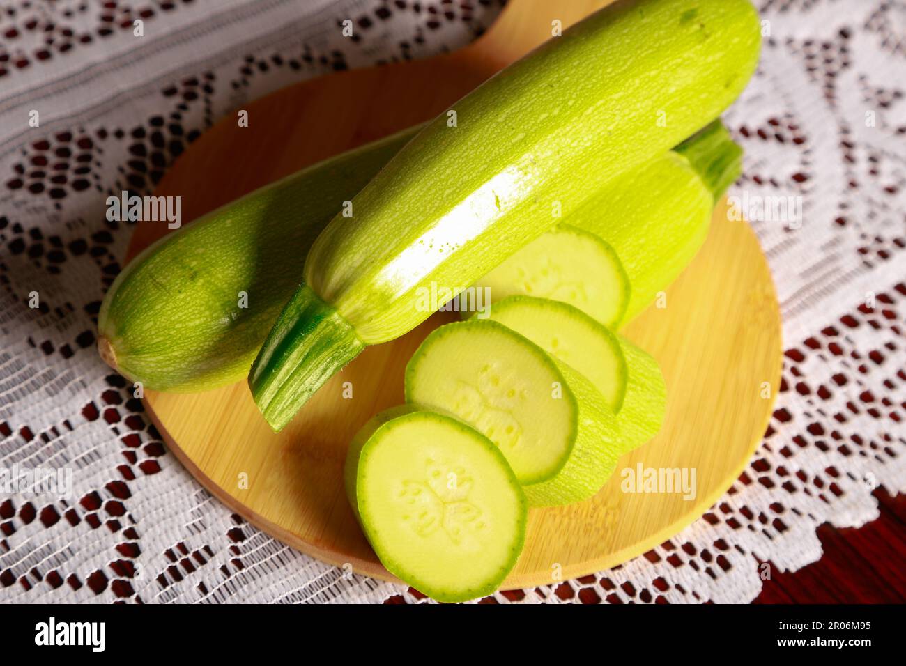 Fresh green courgettes in the kitchen, in natural light Stock Photo - Alamy