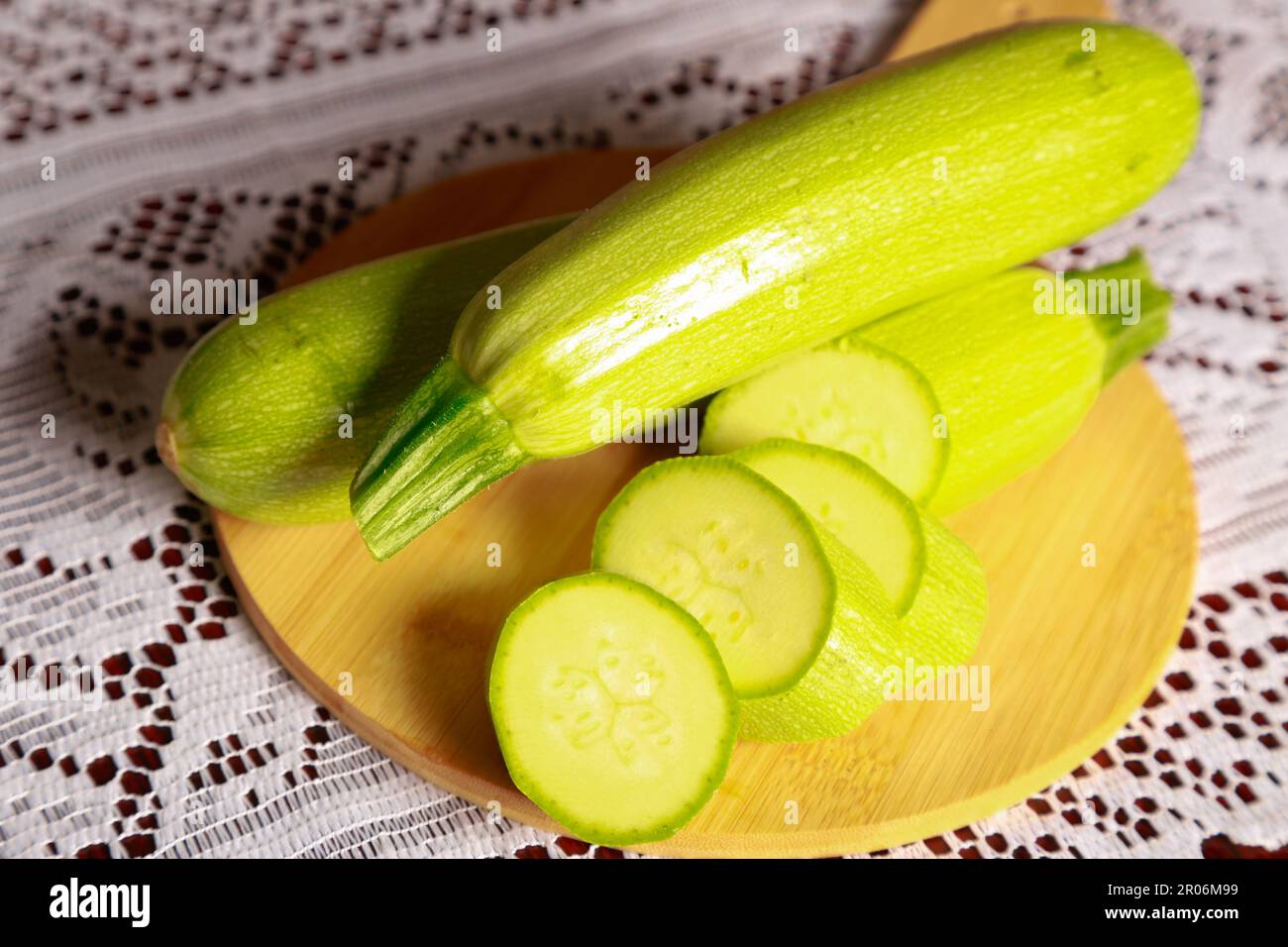 Fresh green courgettes in the kitchen, in natural light Stock Photo - Alamy