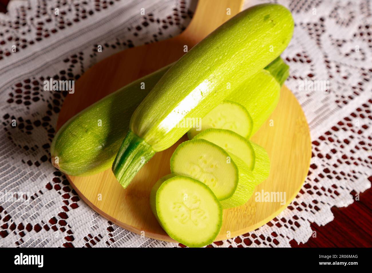 Fresh green courgettes in the kitchen, in natural light Stock Photo - Alamy