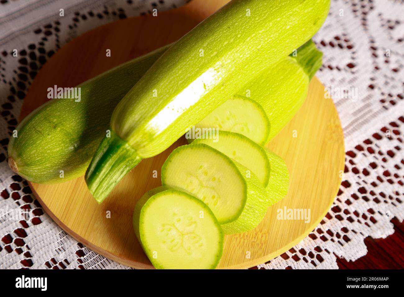 Fresh green courgettes in the kitchen, in natural light Stock Photo - Alamy