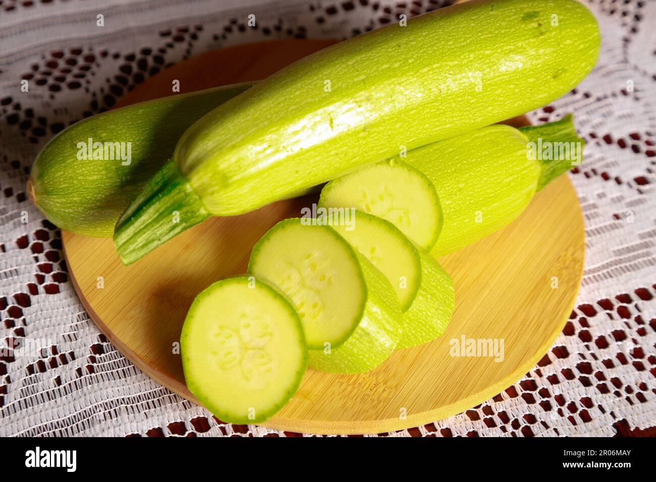 Fresh green courgettes in the kitchen, in natural light Stock Photo - Alamy