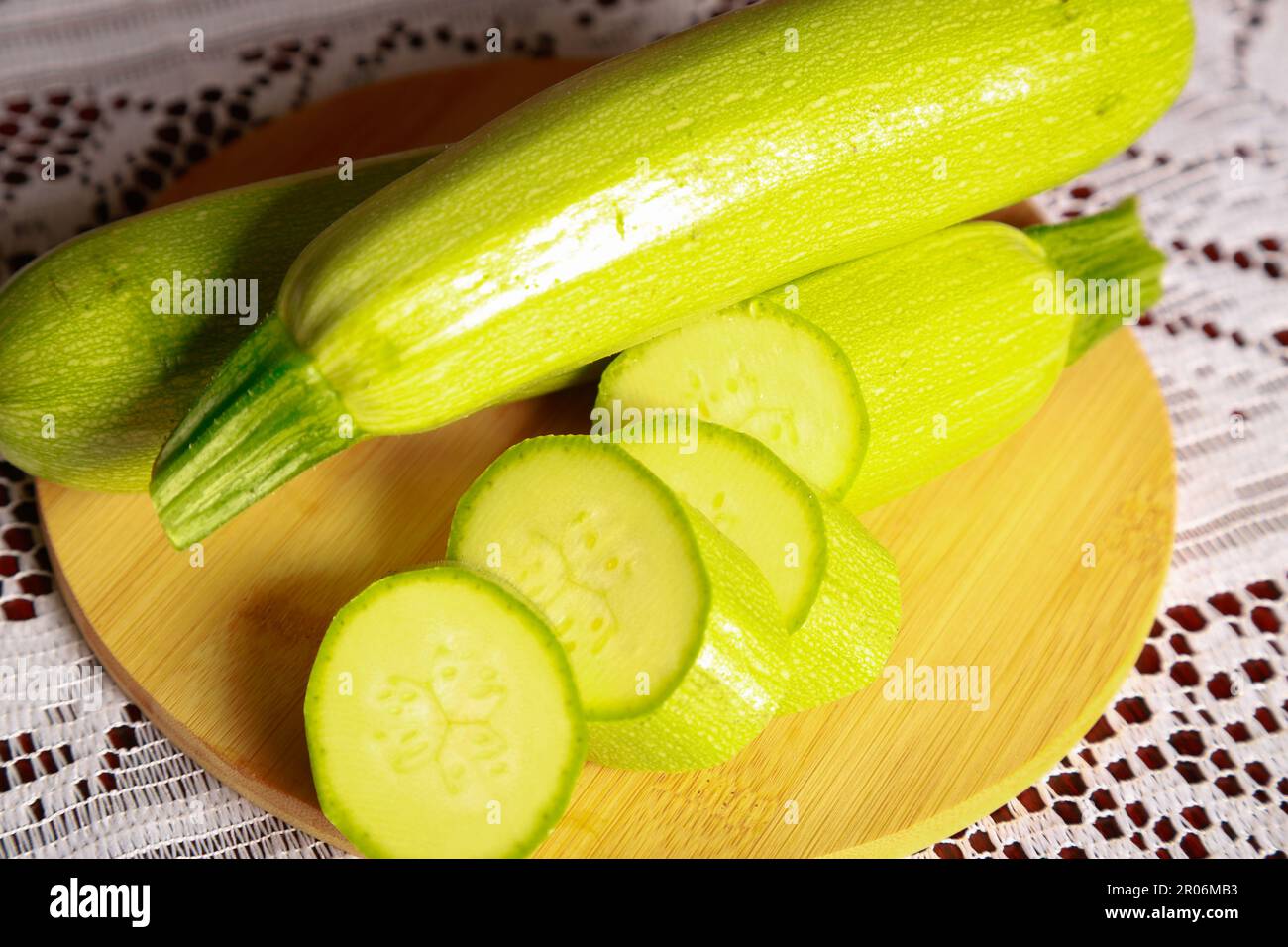 Fresh green courgettes in the kitchen, in natural light Stock Photo - Alamy