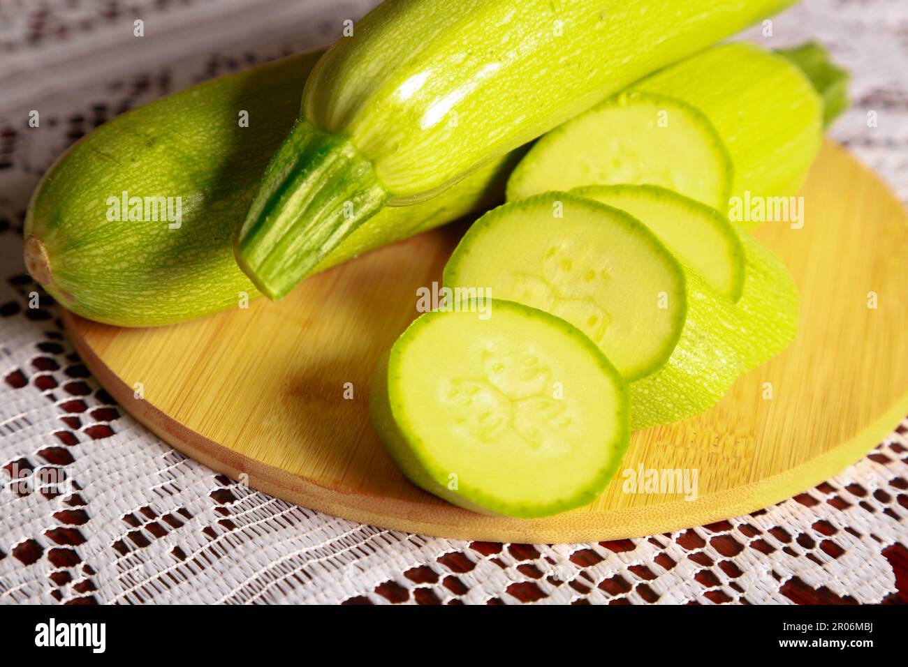 Fresh green courgettes in the kitchen, in natural light Stock Photo - Alamy
