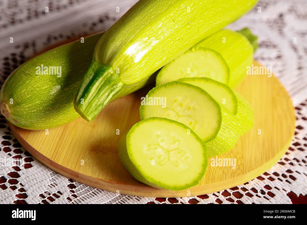 Fresh green courgettes in the kitchen, in natural light Stock Photo - Alamy