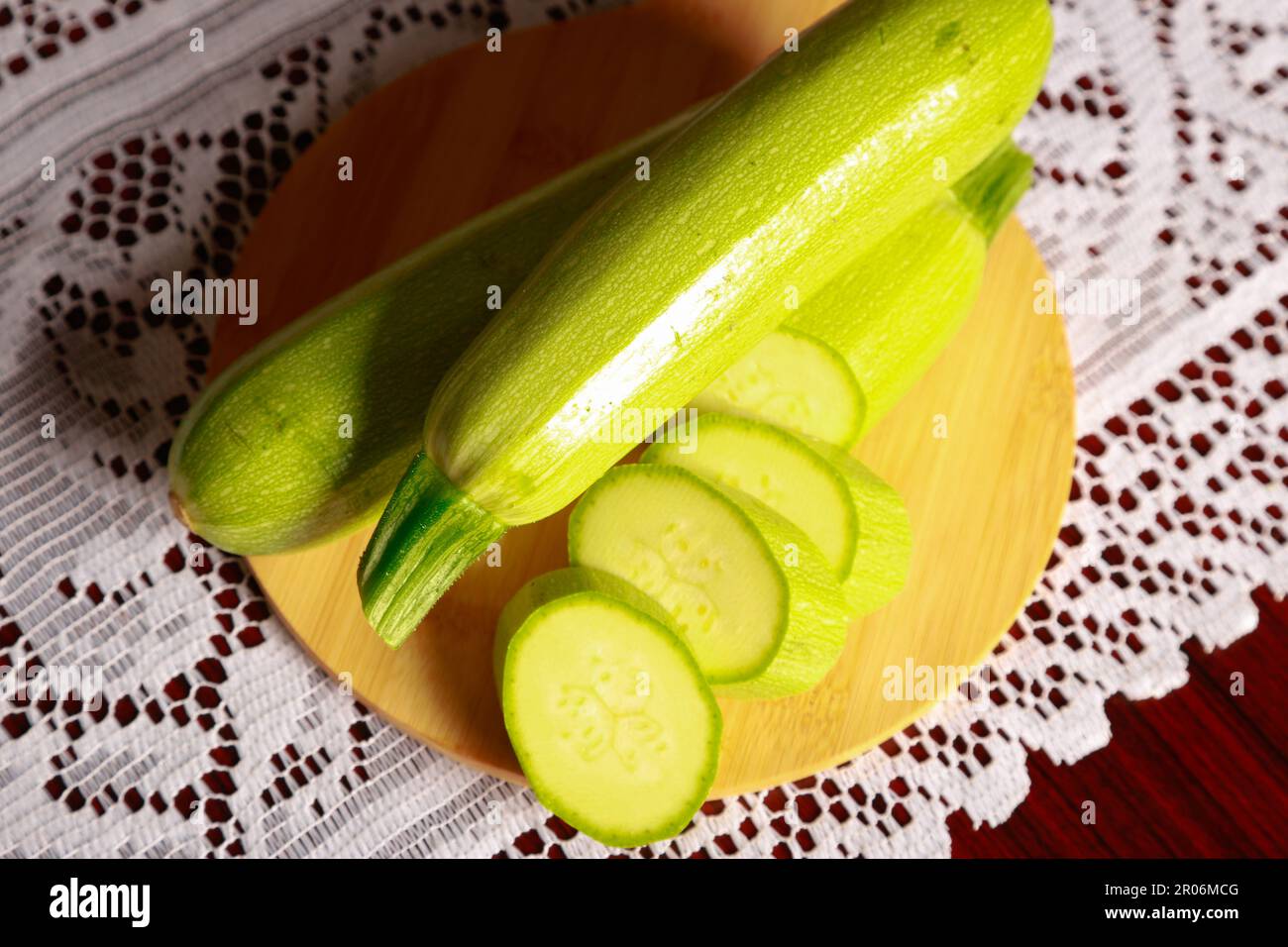 Fresh green courgettes in the kitchen, in natural light Stock Photo - Alamy