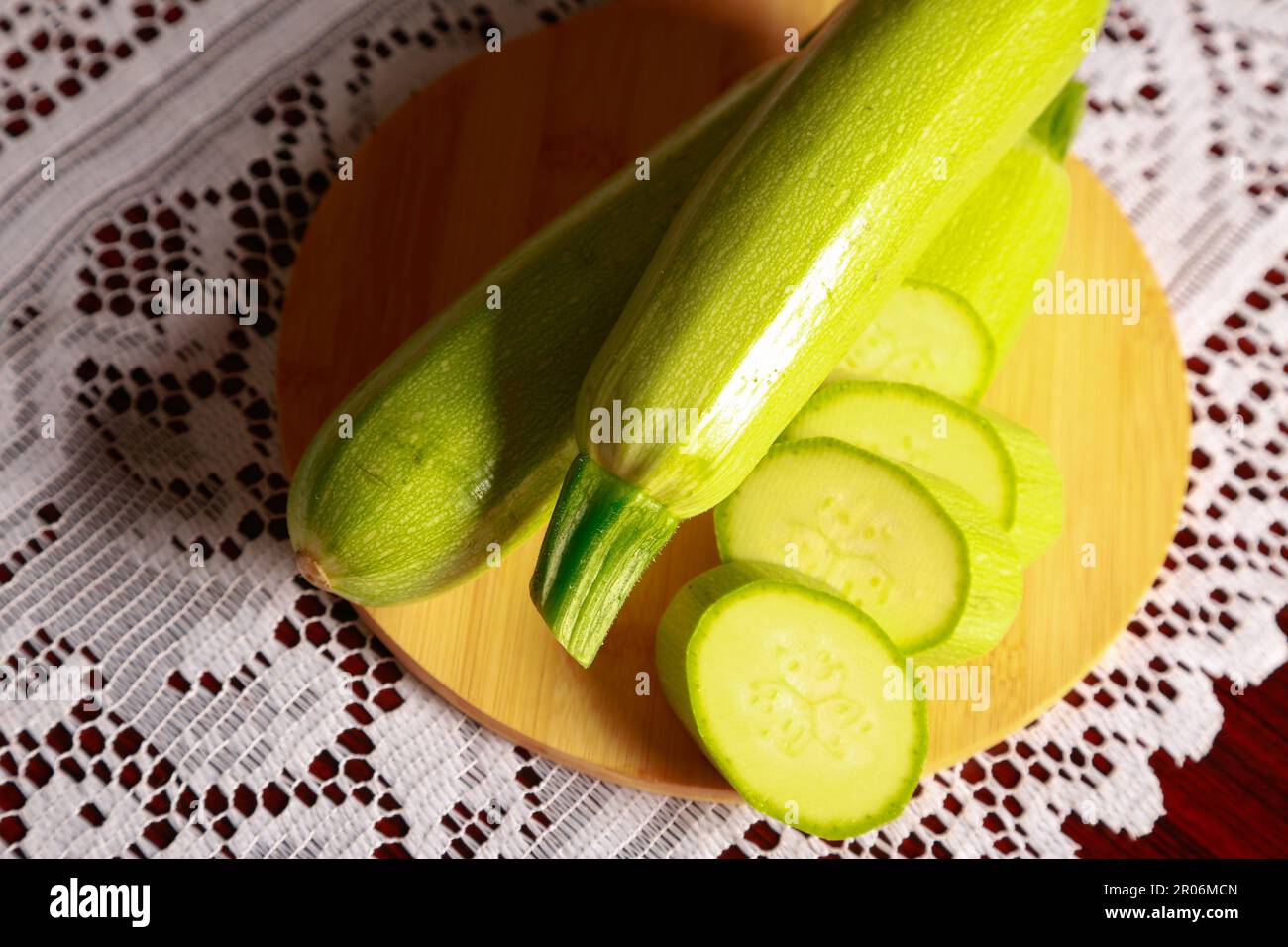 Fresh green courgettes in the kitchen, in natural light Stock Photo - Alamy