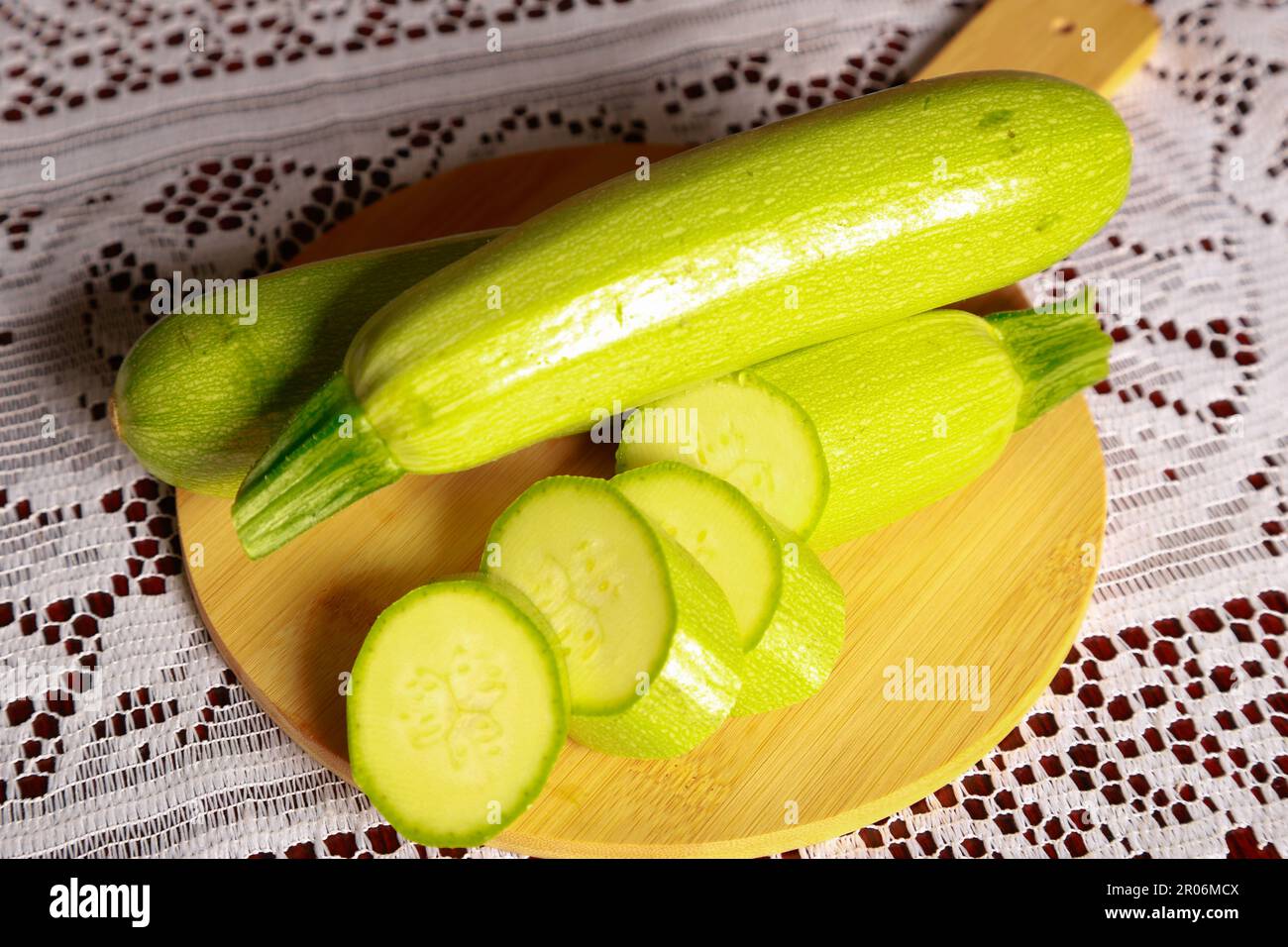 Fresh green courgettes in the kitchen, in natural light Stock Photo - Alamy