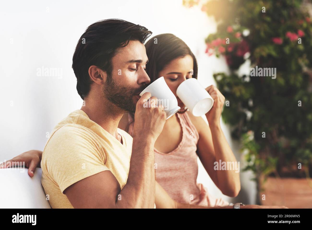 Coffee and love is the most important things in life. a happy young ...