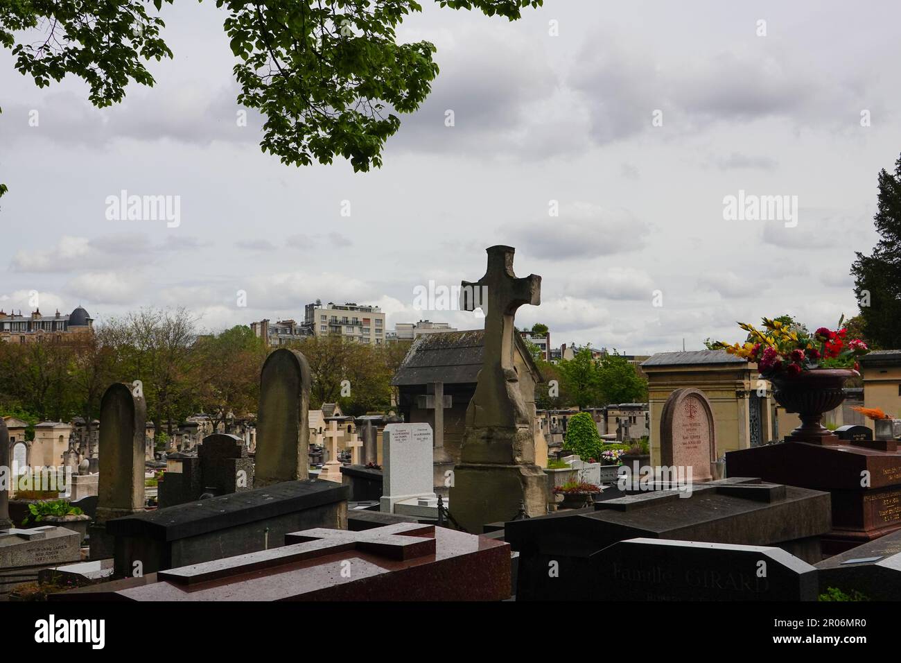 Tombs in Montparnasse Cemetery under grey skies, 14th arrondissement ...